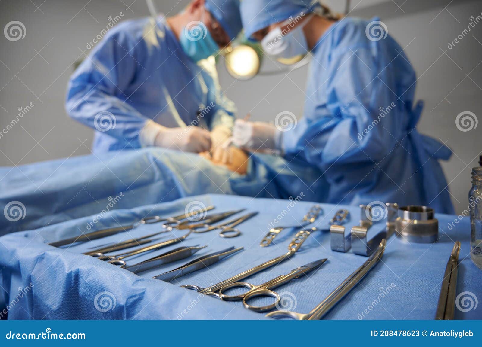 Doctors Doing Plastic Surgery in Operating Room with Medical ...