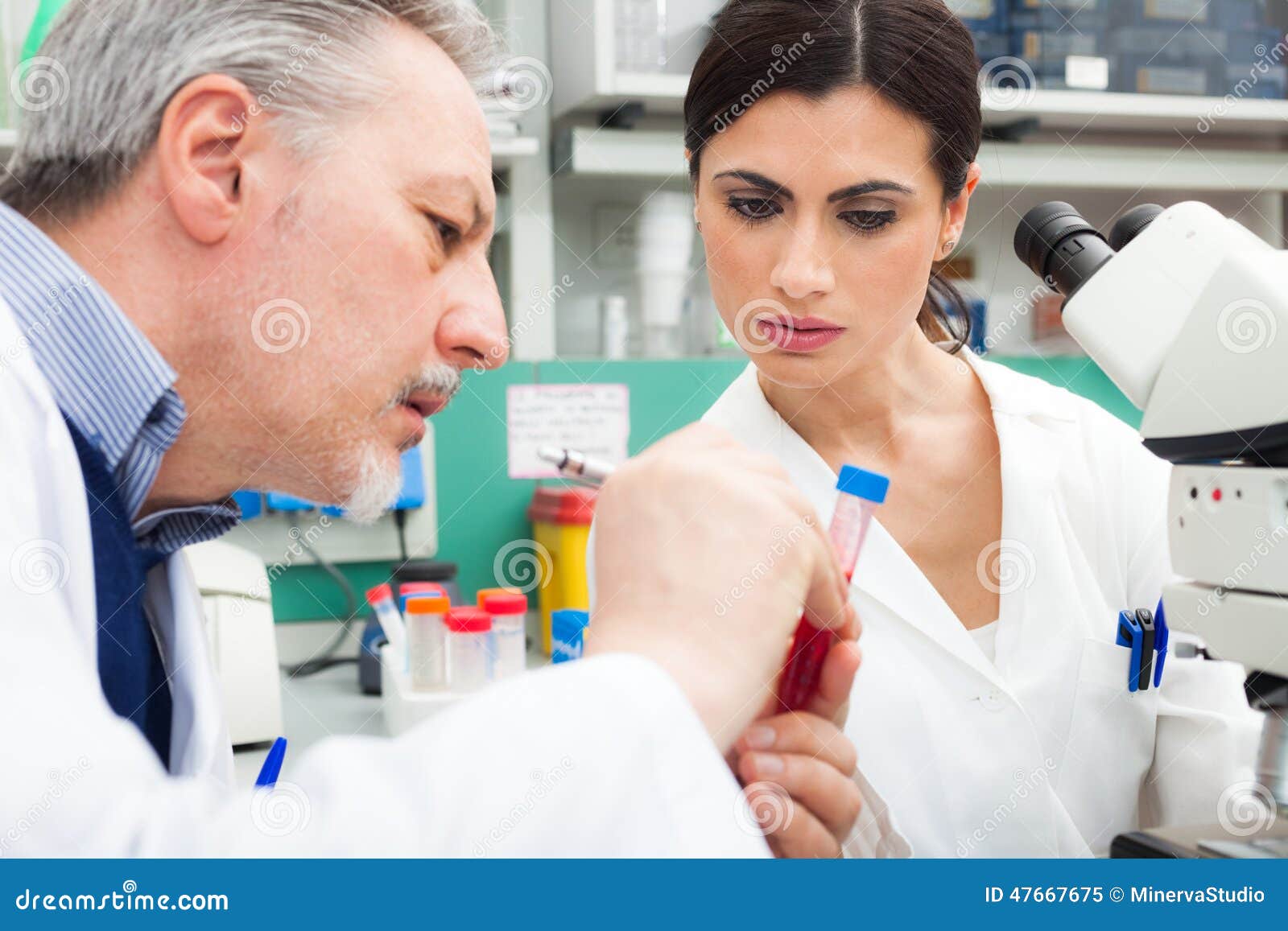 Doctors Examining a Blood Sample Stock Image - Image of medicine, cells ...