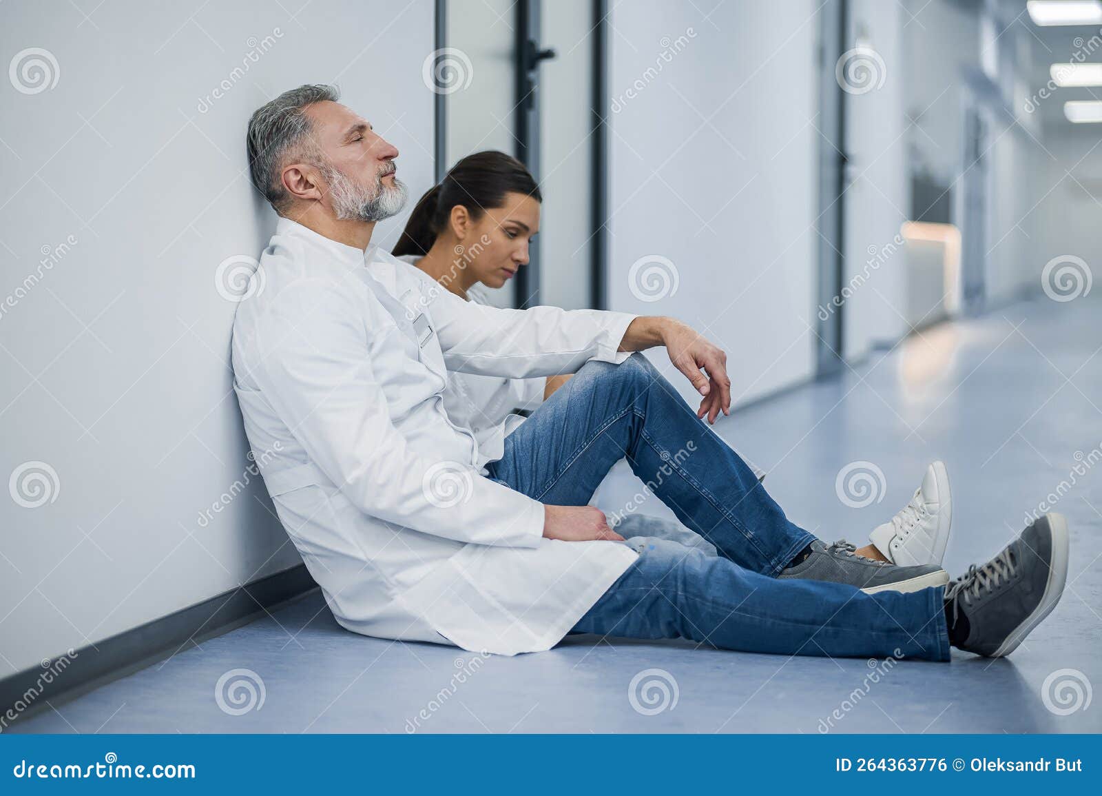 Doctors Feeling Exhausted after the Hard Shift Stock Photo - Image of ...
