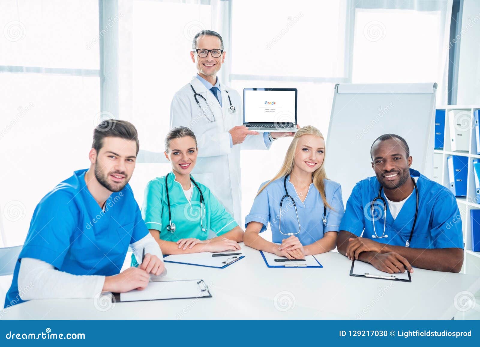 Doctors and General Practitioner with Laptop Editorial Image - Image of ...