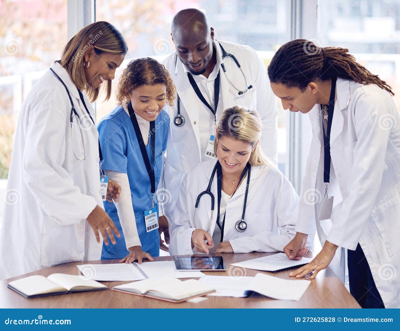 Doctors Group Discussion, Tablet and Desk with Documents, Results or ...