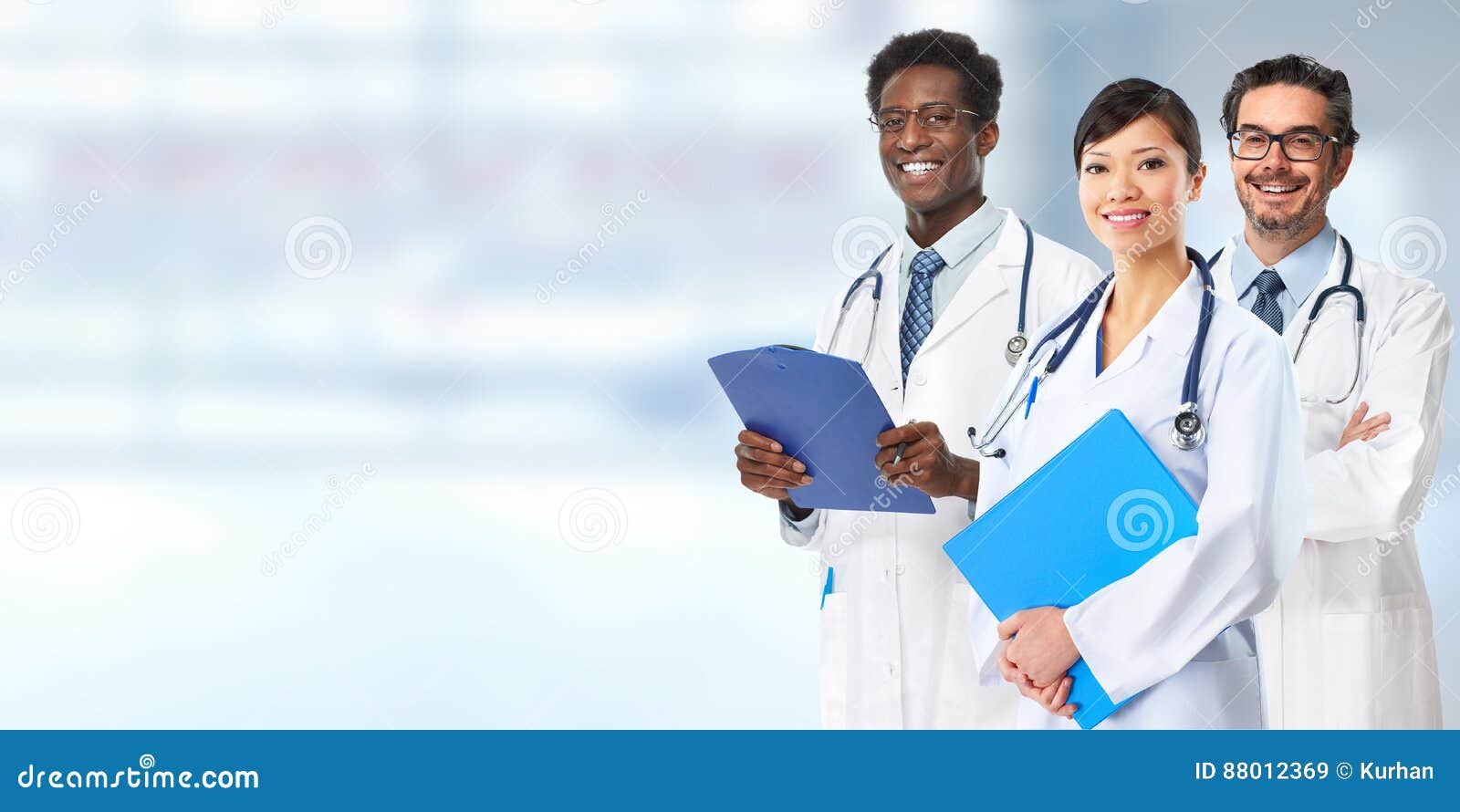 A Group Of Doctors In A Modern Clinic Is Planning. The Concept Of ...