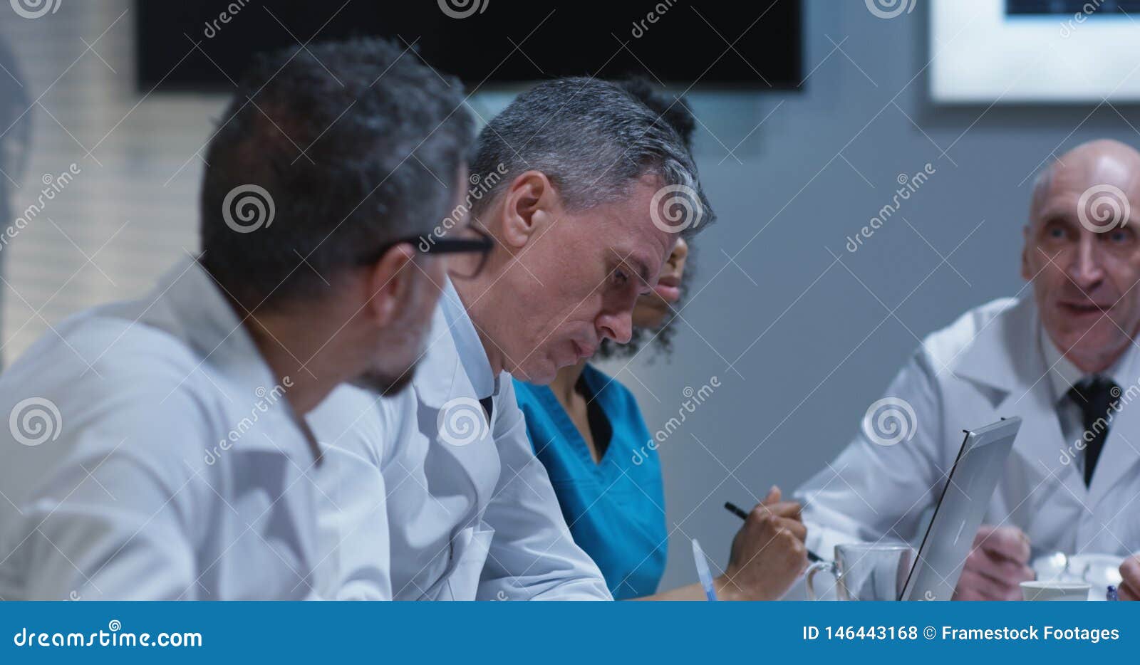 Doctors having a meeting stock photo. Image of teamwork - 146443168