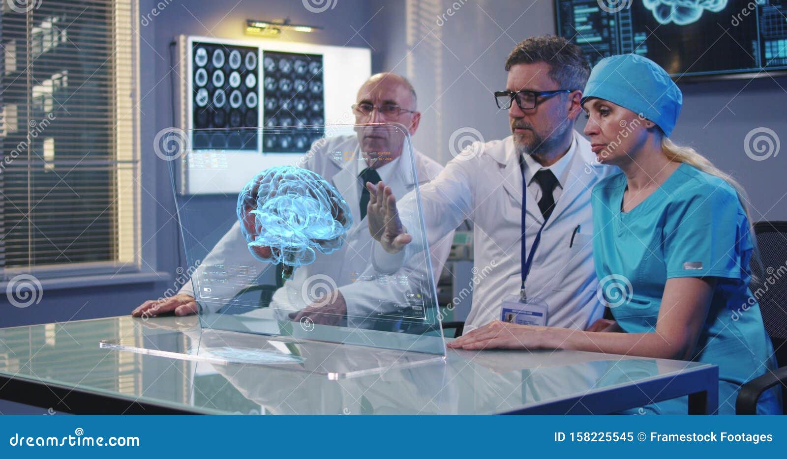 Doctors having video call stock image. Image of examining - 158225545