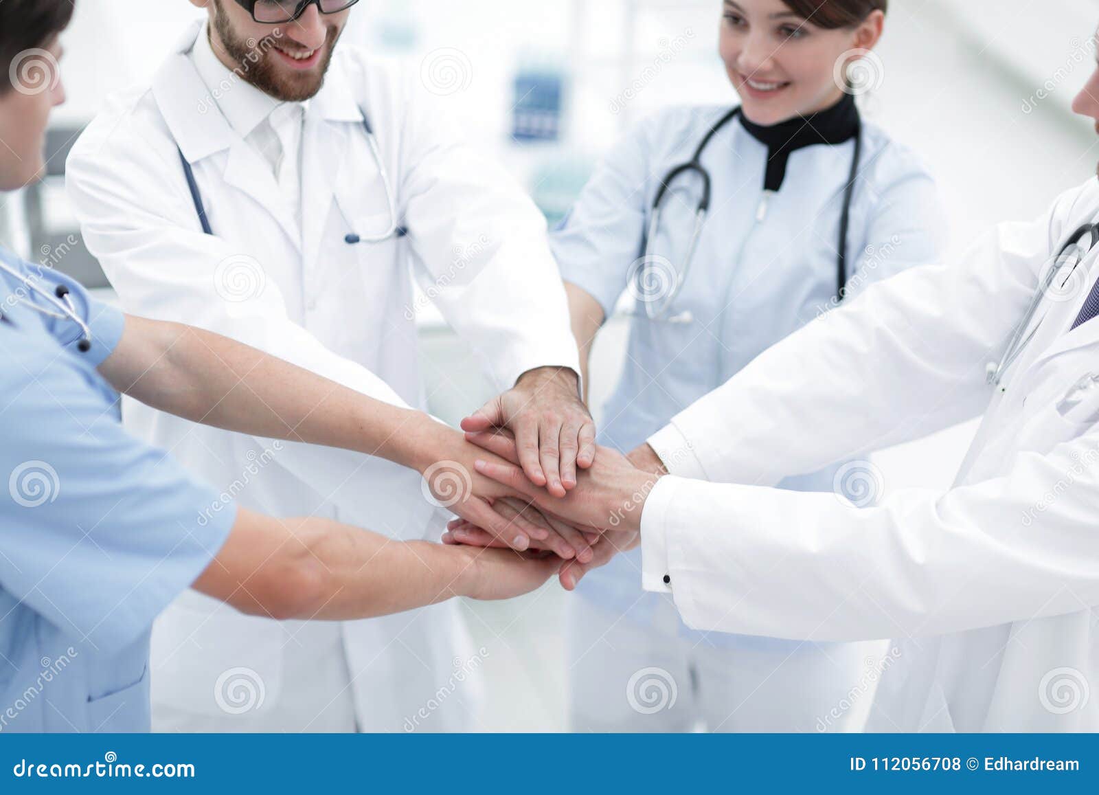 Doctors Holding Hands Together at Hospital Stock Photo - Image of medic ... Doctors Holding Hands Together at Hospital Stock Photo - Image of medic ...
