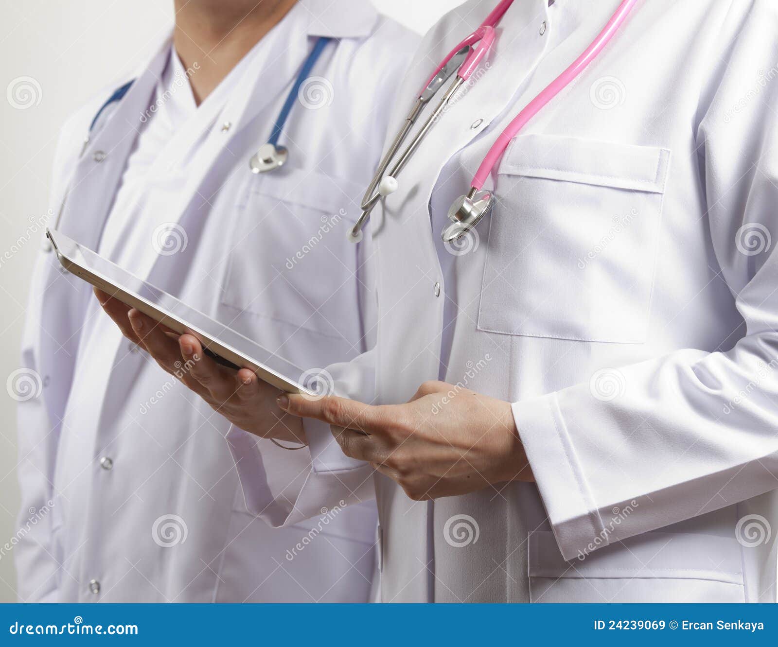 Doctors holding tablet pc stock image. Image of human - 24239069