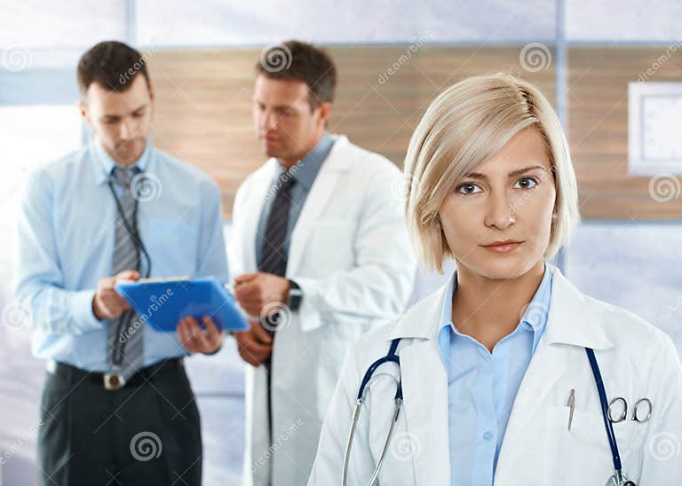 Doctors on Hospital Corridor Stock Image - Image of analysis, coat ...