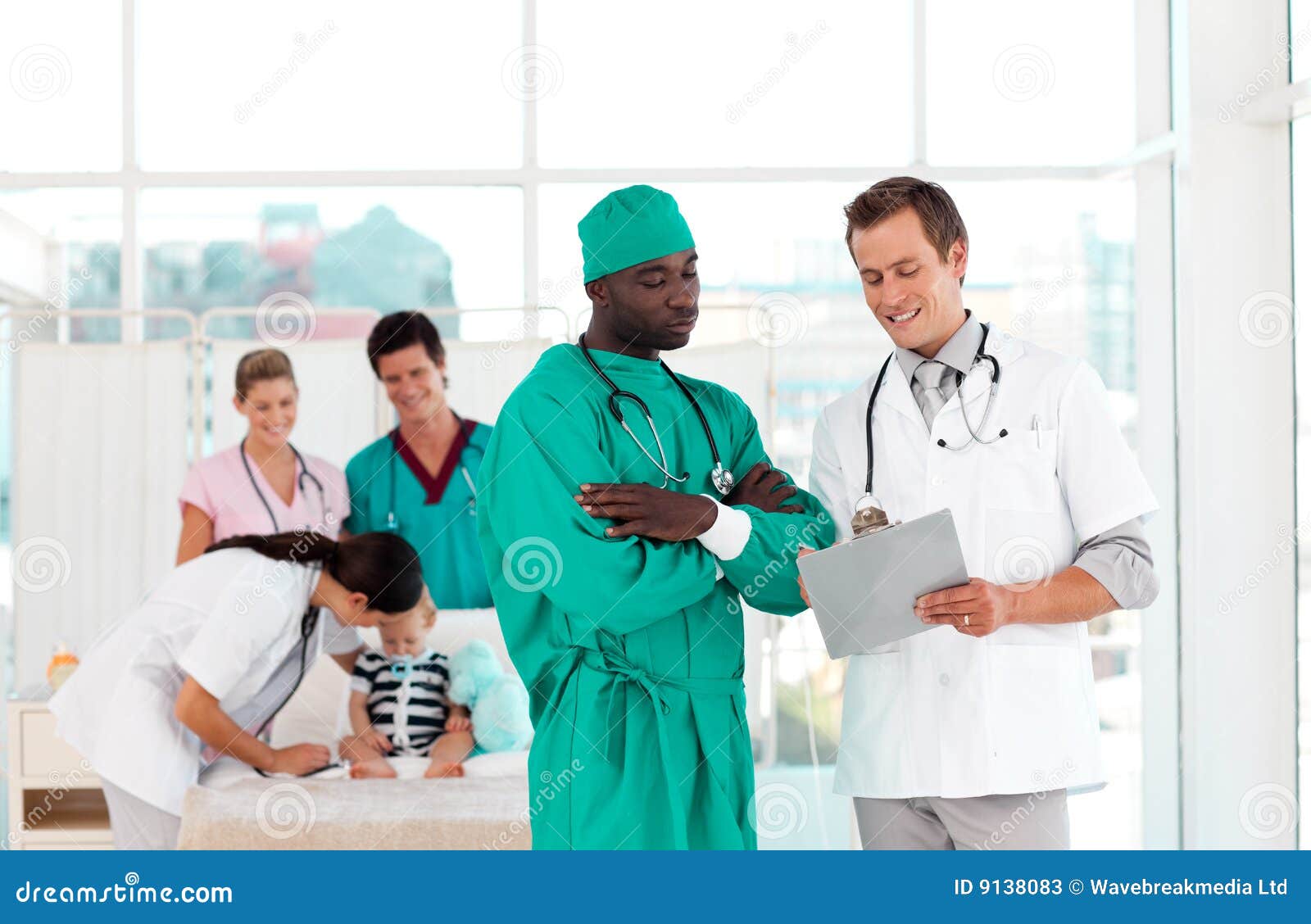Doctors in a Hospital Looking after a Patient Stock Image - Image of ...
