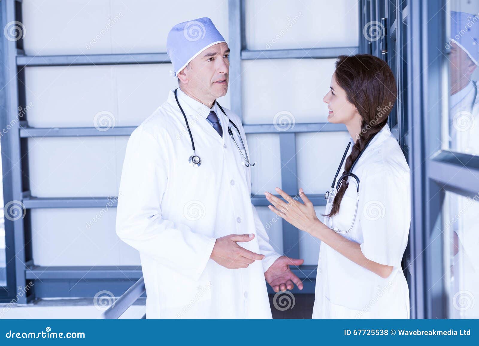 Doctors Interacting with Each Other Stock Photo - Image of interaction ...