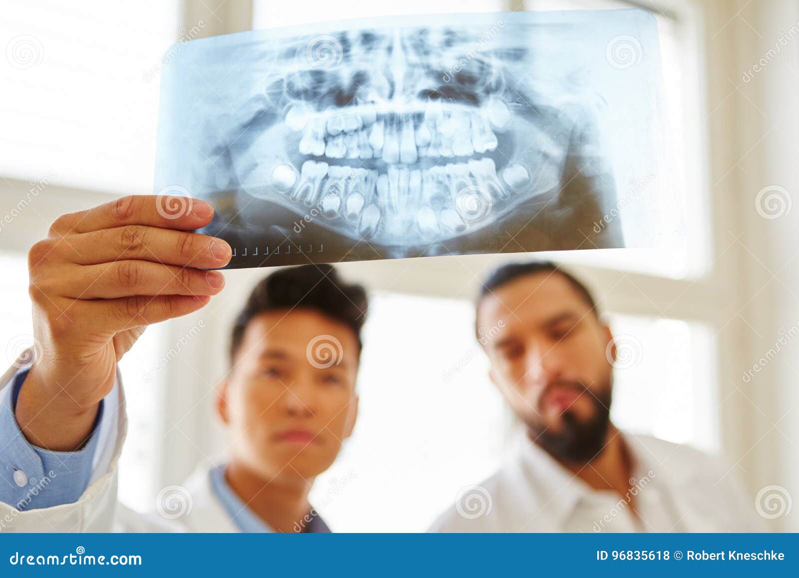 Doctors Looking Ad X-ray Image Stock Photo - Image of surgery ...
