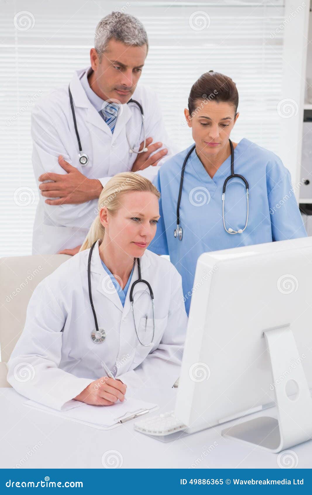 Doctors Looking at Computer Stock Image - Image of monitor, health ...