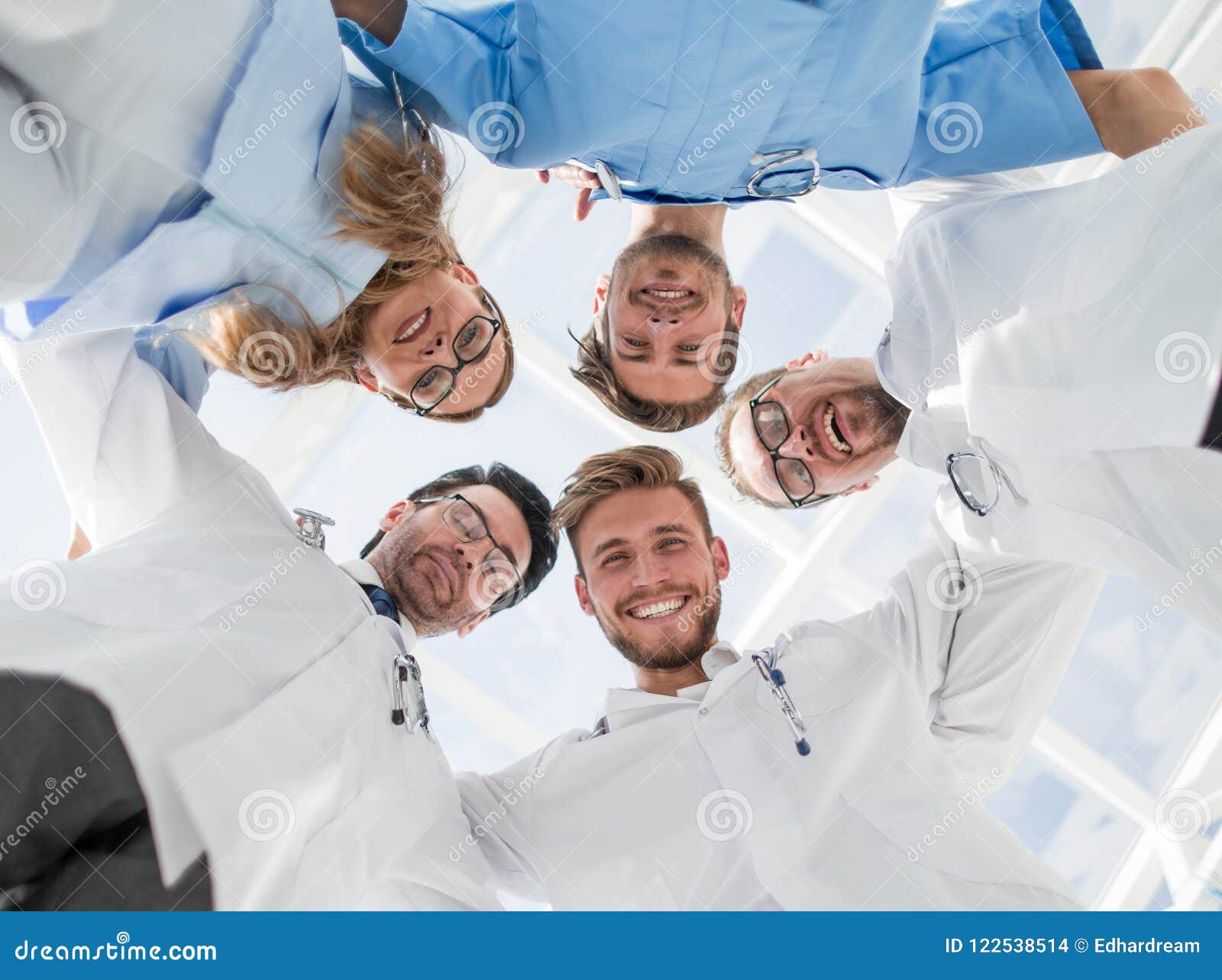 Doctors Looking Down Smiling at the Camera Stock Photo - Image of look ...