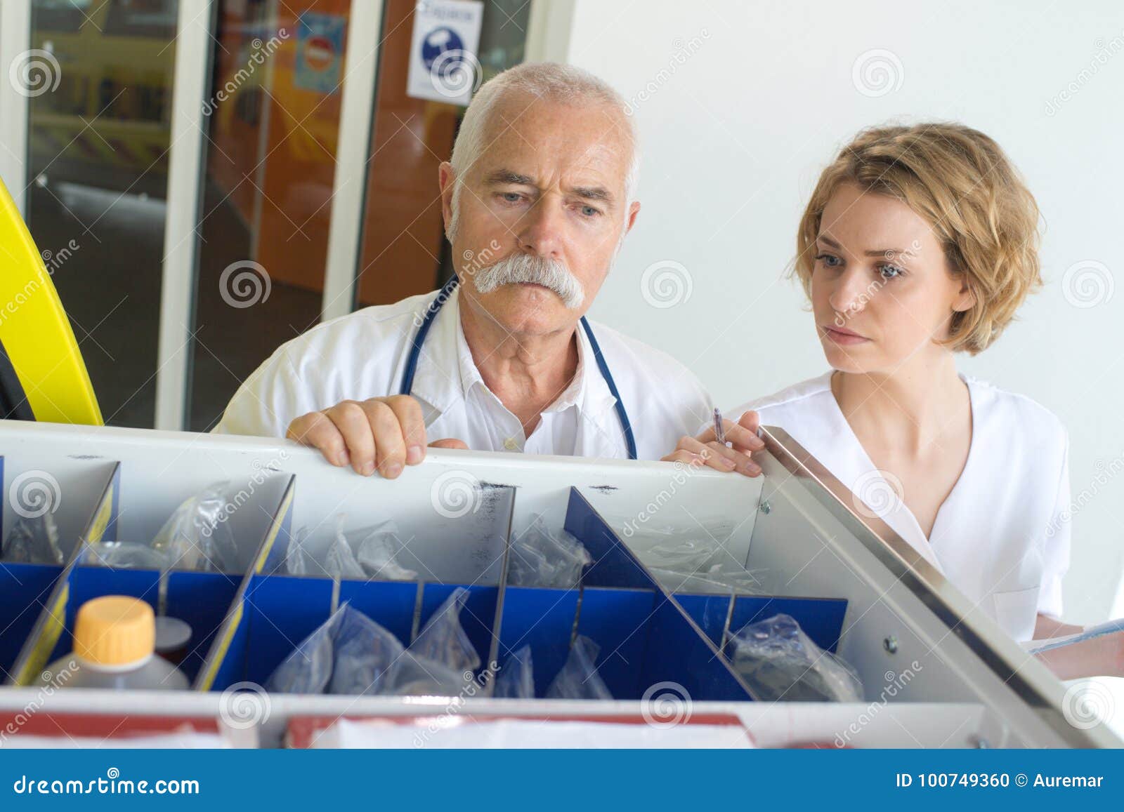 Doctors Looking for Medical Products Stock Photo - Image of drug ...