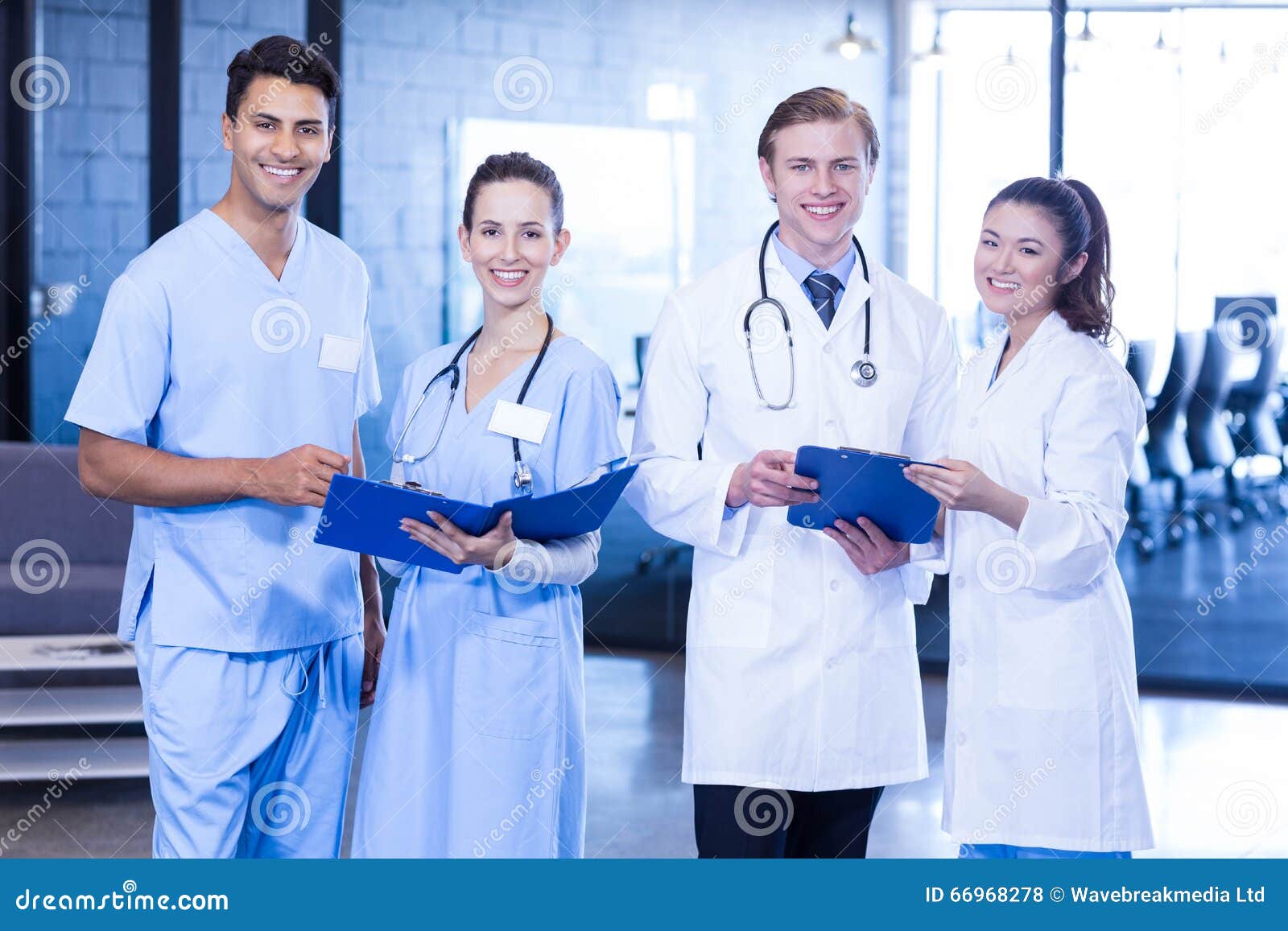 Doctors Looking at Medical Report Stock Photo - Image of female, asian ...
