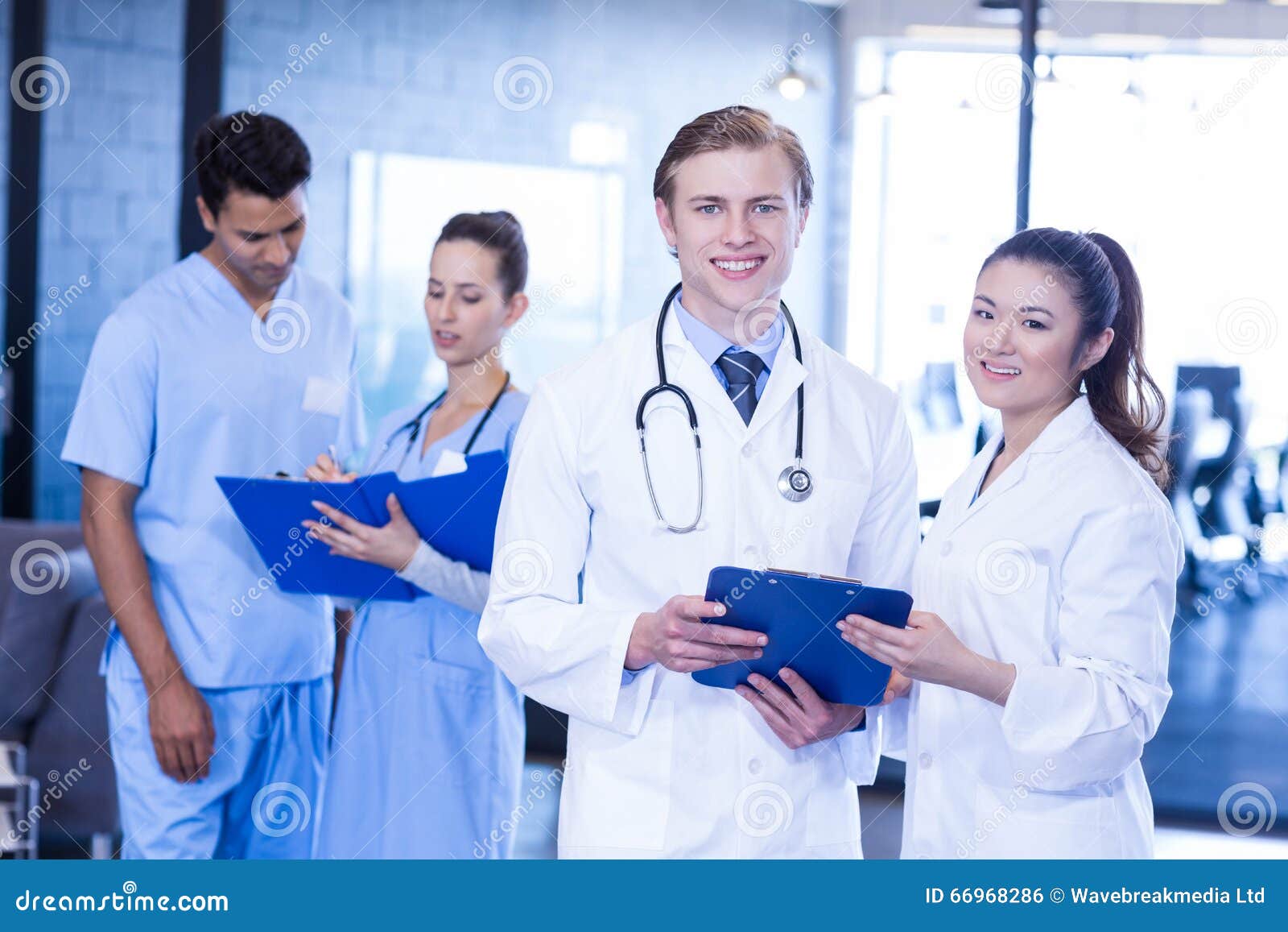 Doctors Looking at Medical Report Stock Photo - Image of adult, health ...