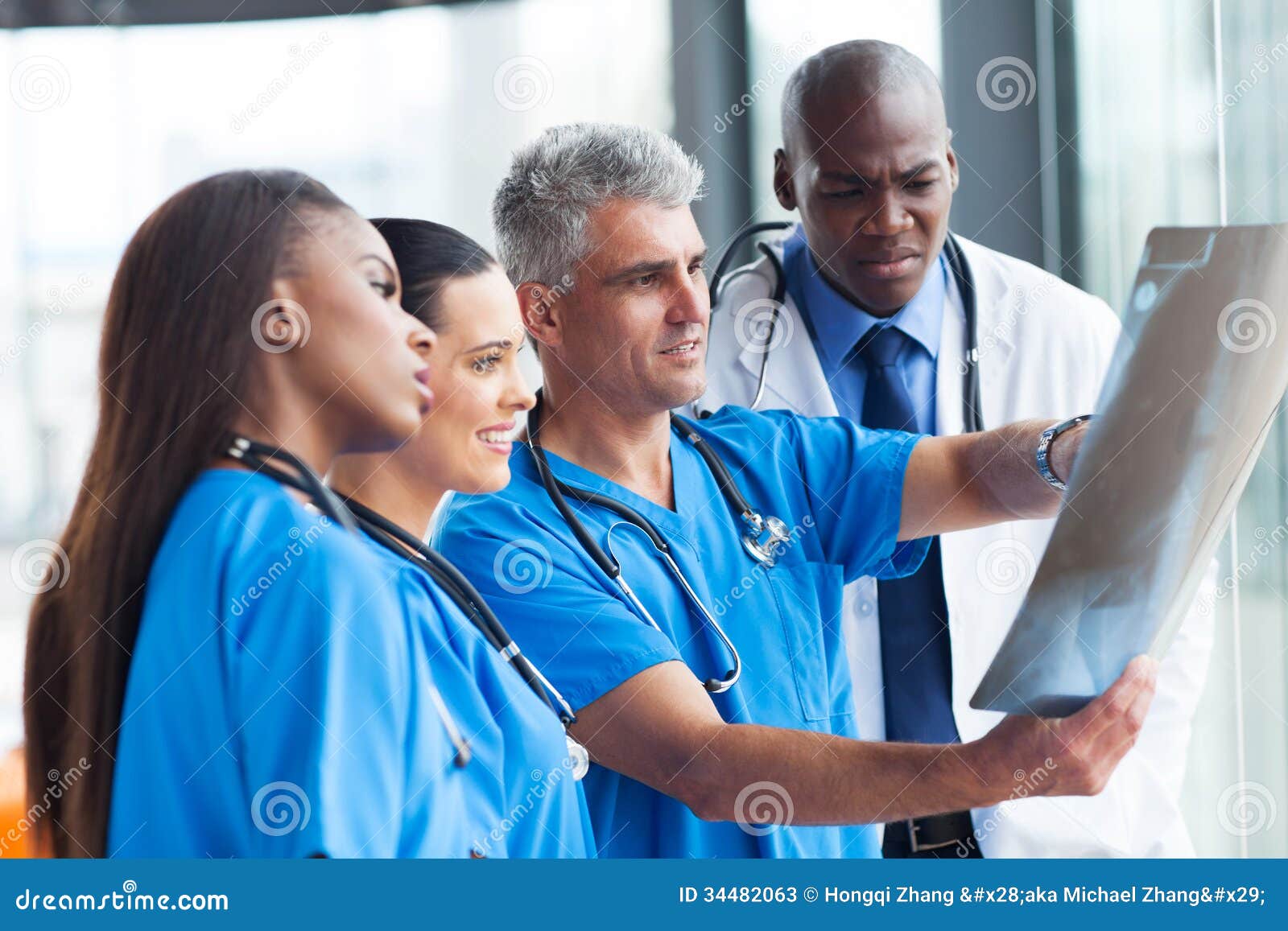 Doctors looking x-ray stock image. Image of handsome - 34482063