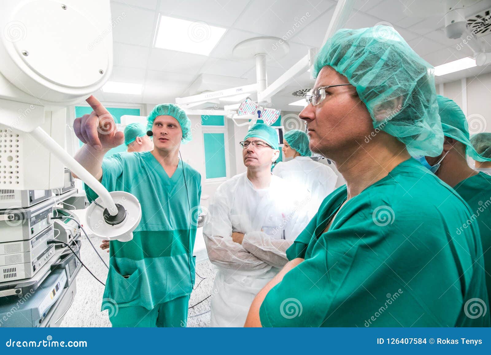 Doctors Looking into the Screen in Surgery Room Editorial Stock Image ...