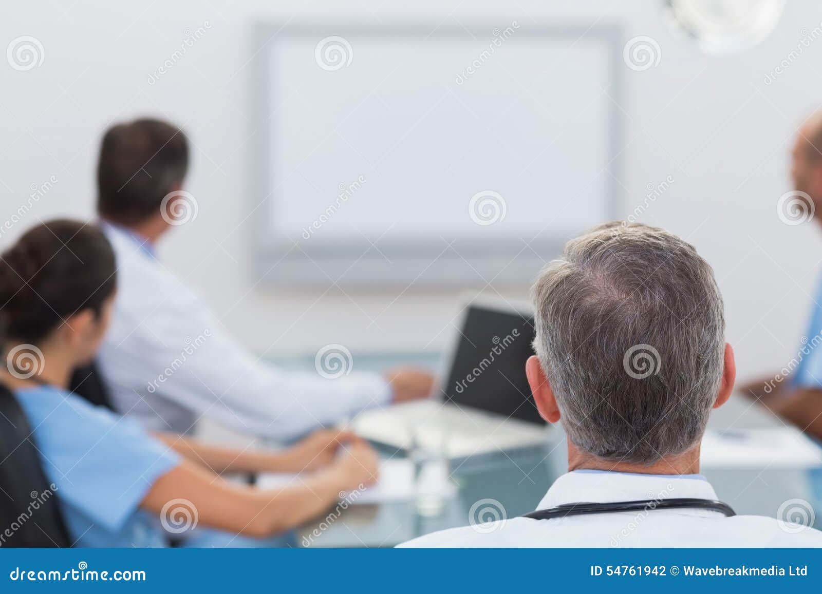 Doctors Looking at White Board Stock Photo - Image of people, office ...