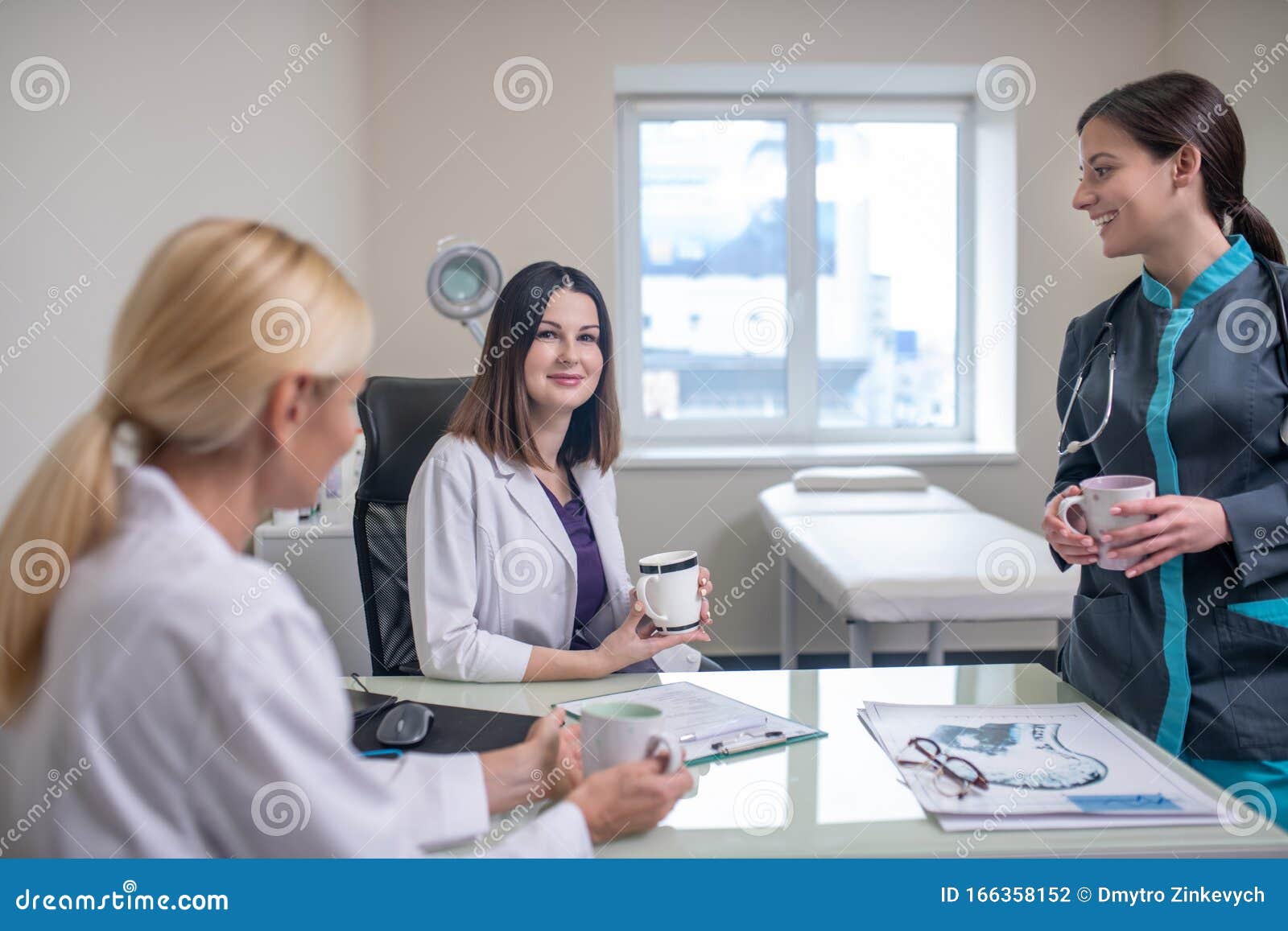 Doctors in Neurologycal Clinic Having Shift Change Stock Photo - Image ...