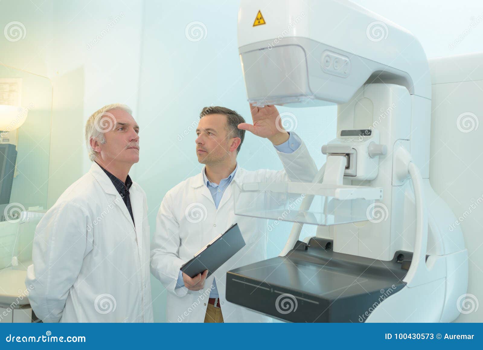 Doctors Next To Ultrasound Machine Stock Image - Image of clinic ...
