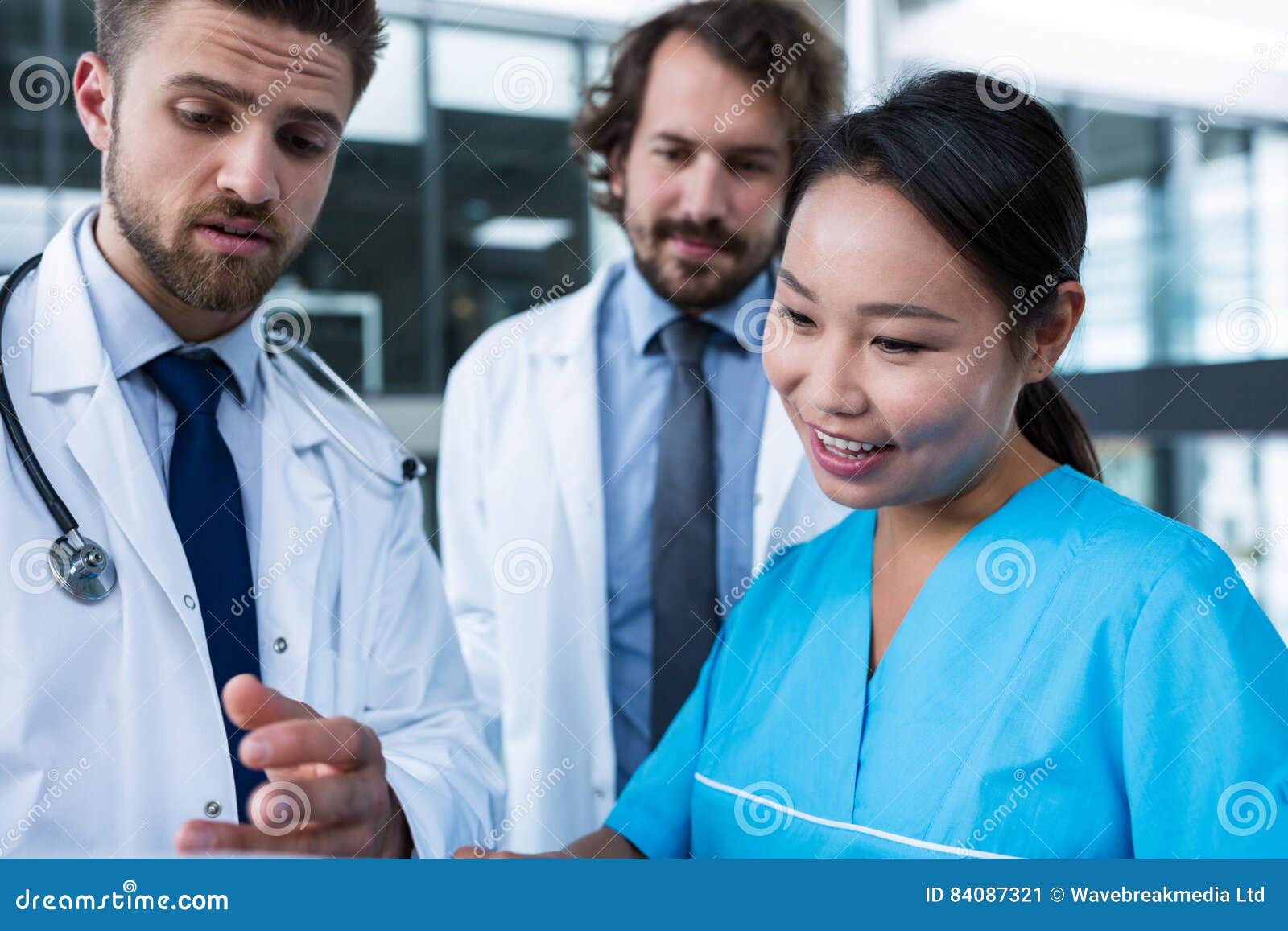 Doctors and Nurse Having a Discussion Stock Image - Image of medical ...
