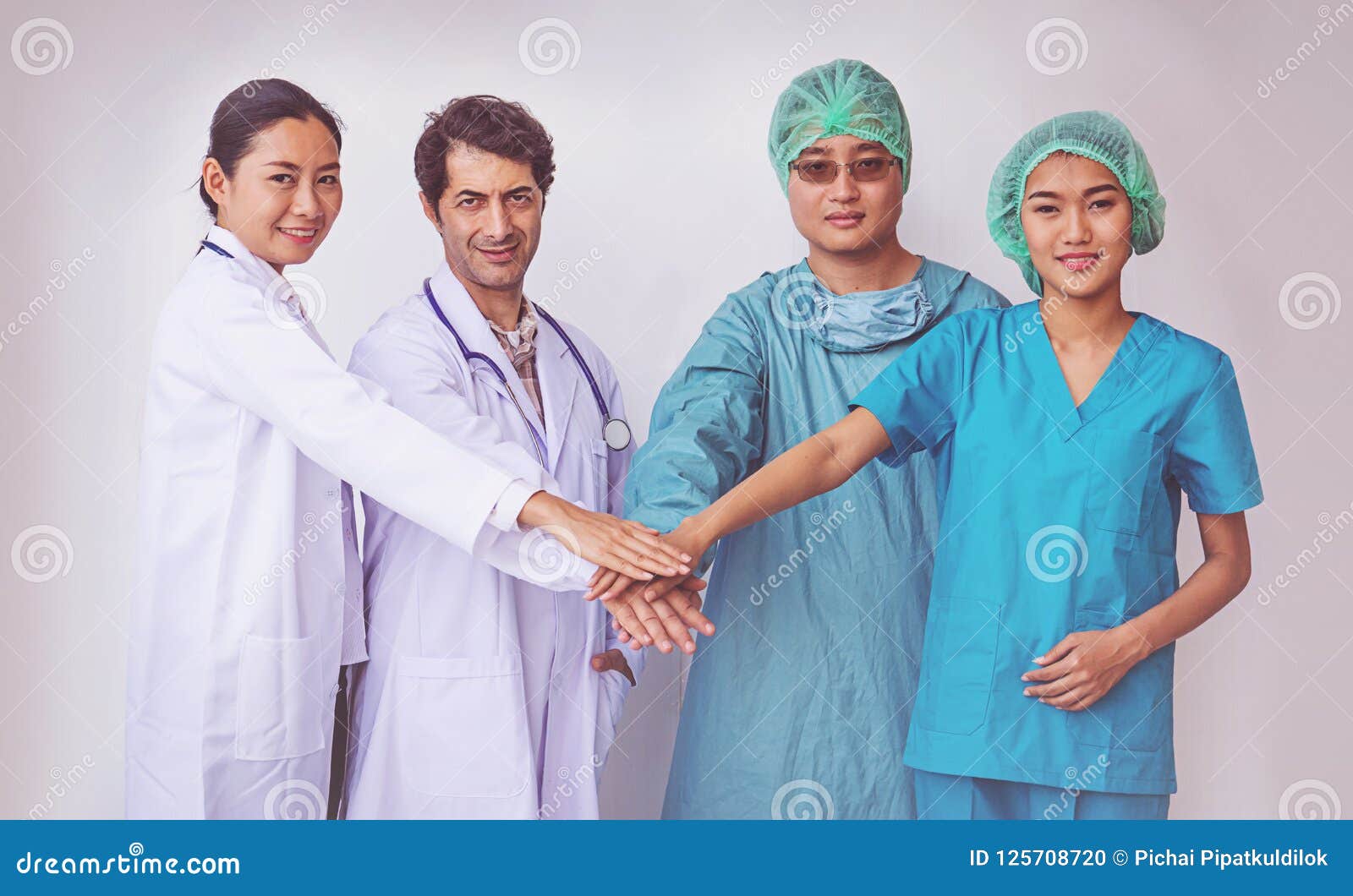 Doctors and Nurses Coordinate Hands. Concept Teamwork Stock Photo ...