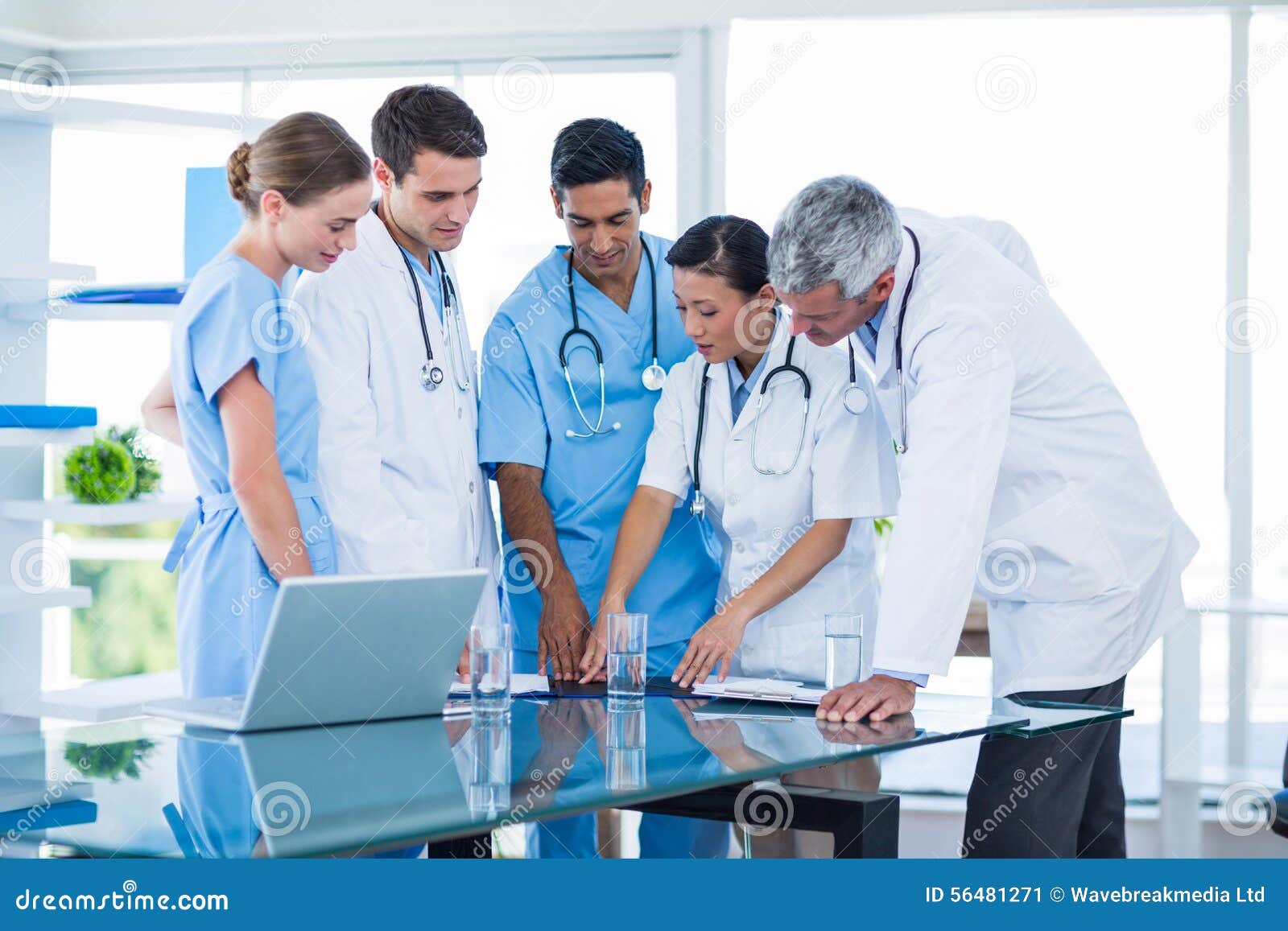 Doctors and Nurses Discussing Together Stock Image - Image of ...