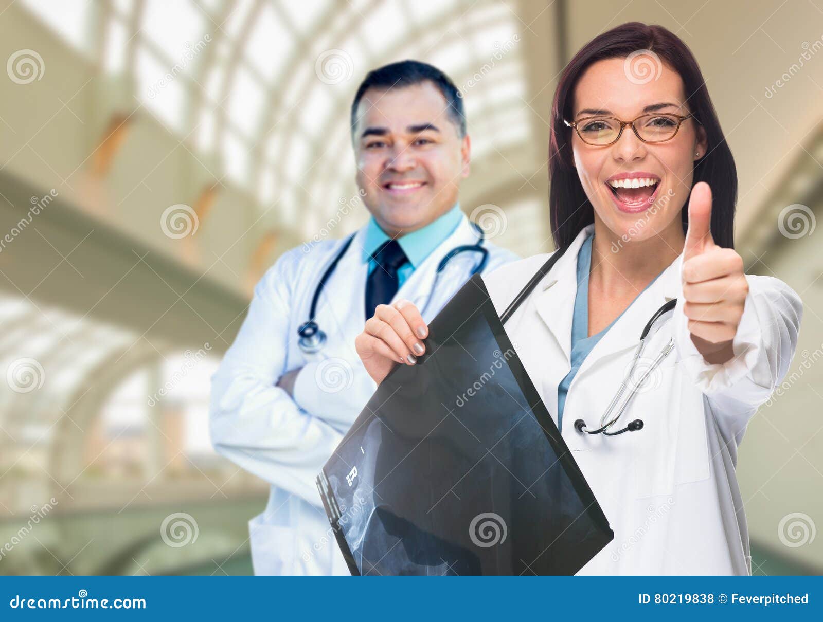 Doctors or Nurses Holding X-ray Inside Hospital Stock Photo - Image of ...