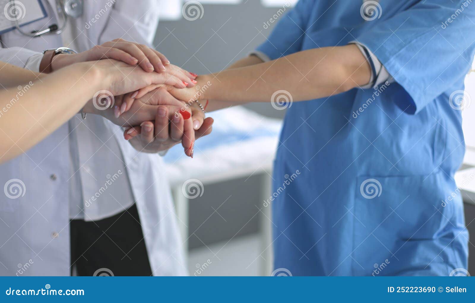 Doctors and Nurses in a Medical Team Stacking Hands Stock Photo - Image ...