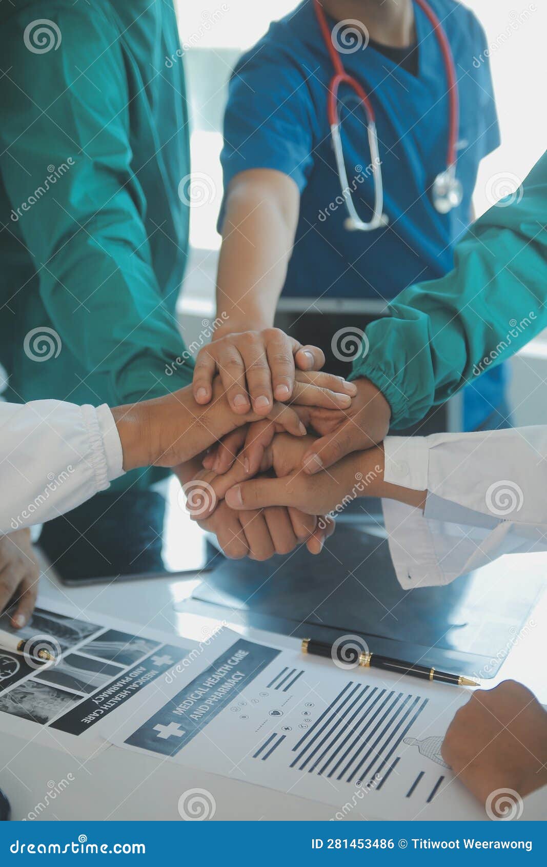 Doctors and Nurses in a Medical Team Stacking Hands Stock Photo - Image ...