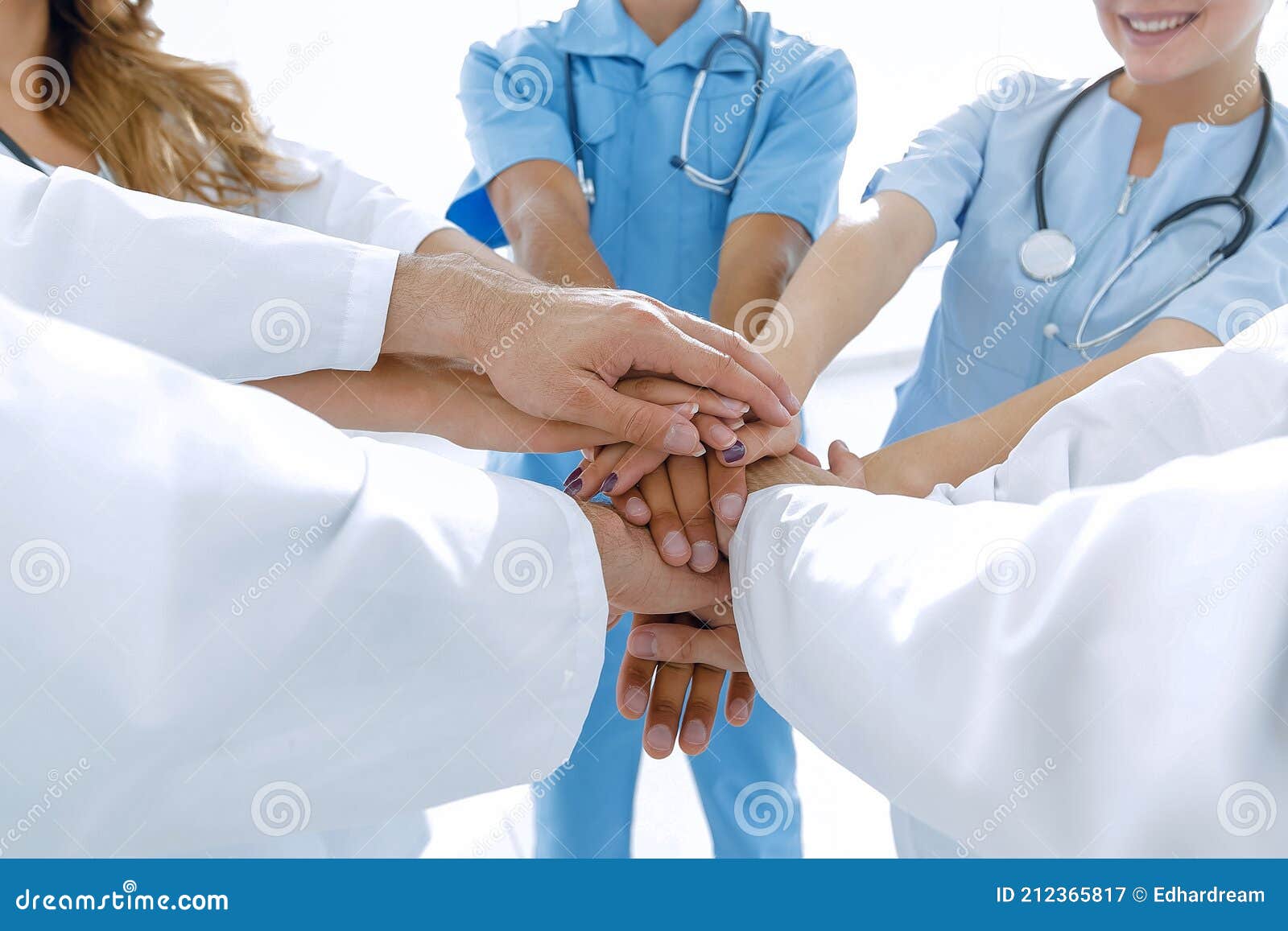 Doctors and Nurses in a Medical Team Stacking Hands Stock Image - Image ...
