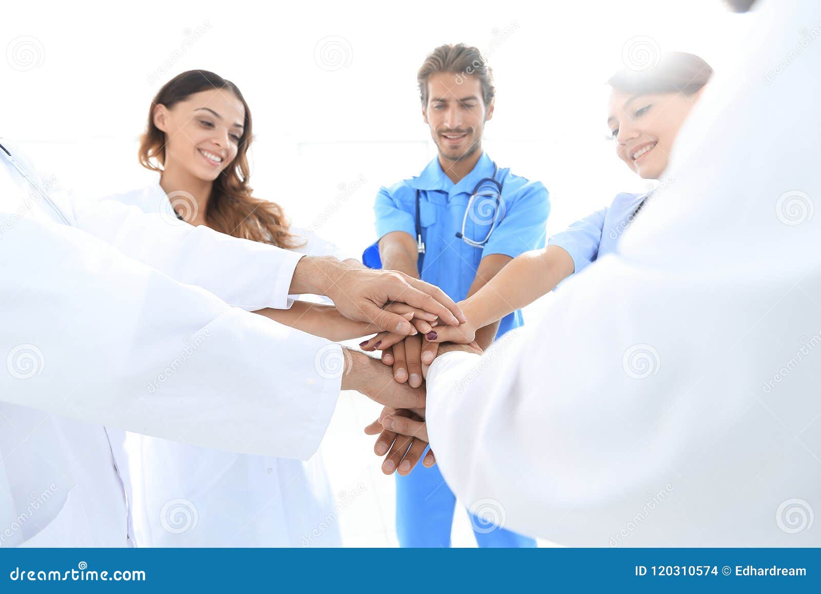 Doctors and Nurses in a Medical Team Stacking Hands Stock Photo - Image ...