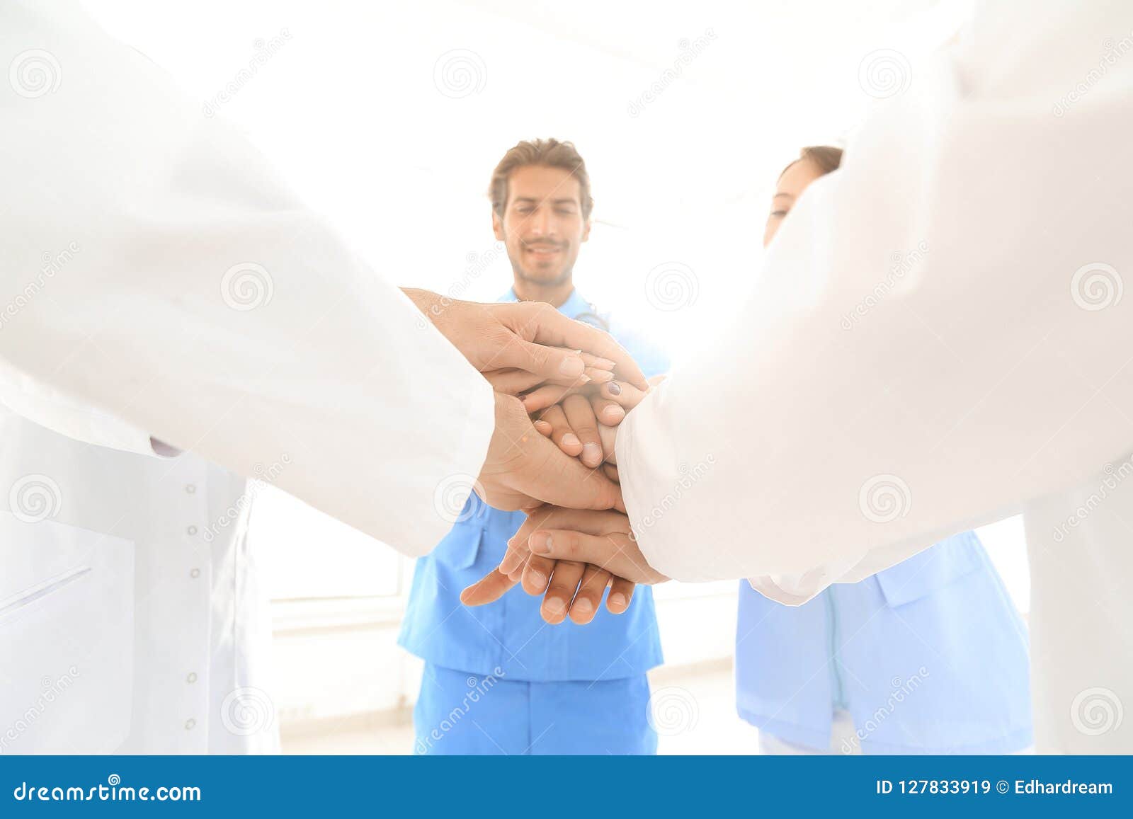Doctors and Nurses in a Medical Team Stacking Hands Stock Image - Image ...