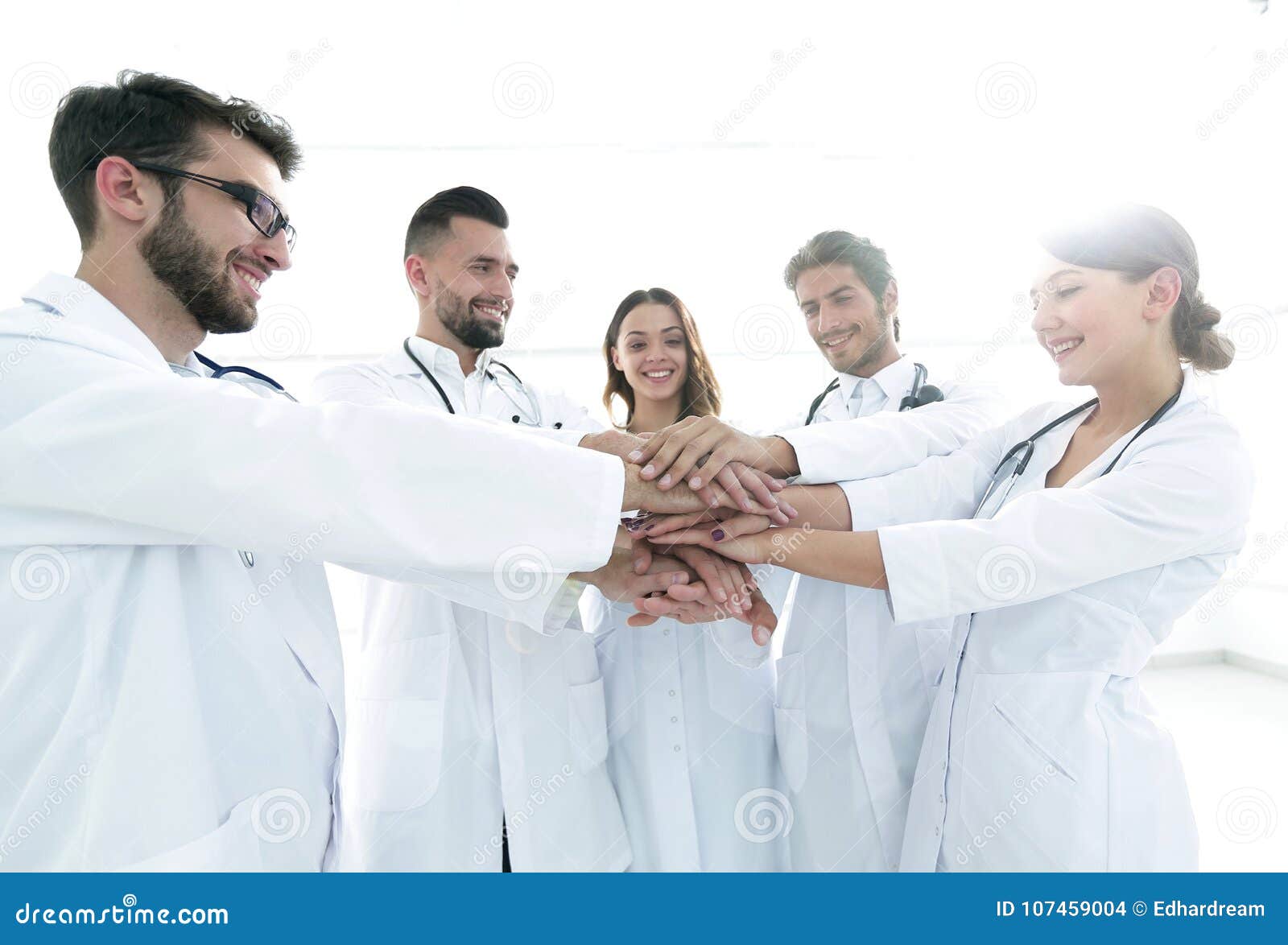 Doctors and Nurses in a Medical Team Stacking Hands Stock Photo - Image ...