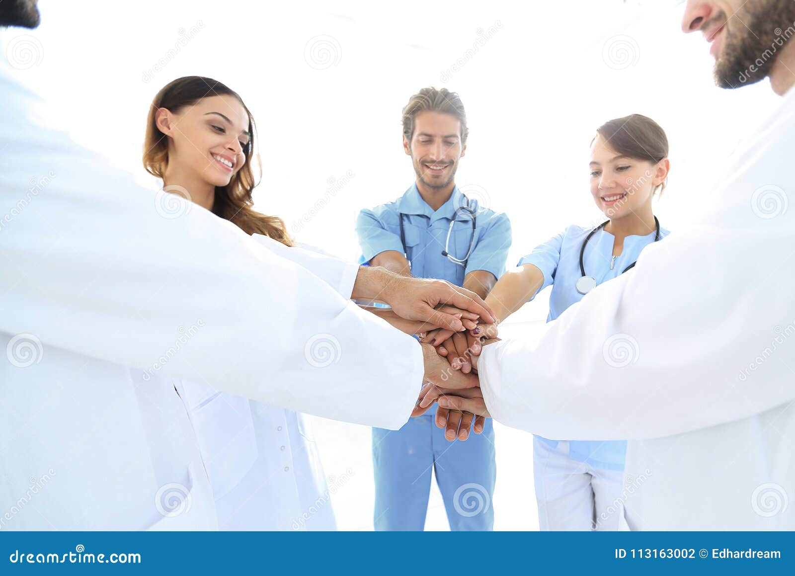 Doctors and Nurses in a Medical Team Stacking Hands Stock Photo - Image ...