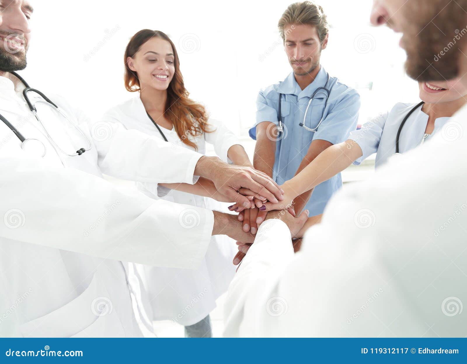 Doctors and Nurses in a Medical Team Stacking Hands Stock Image - Image ...