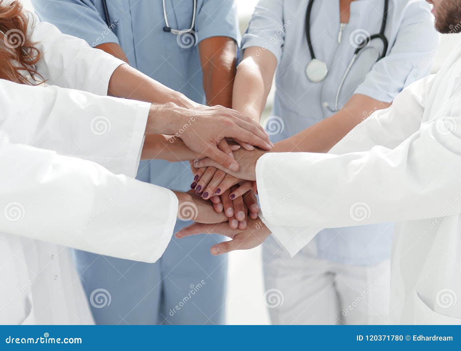 Doctors and Nurses Stacking Hands. Concept of Mutual Aid. Stock Photo ...