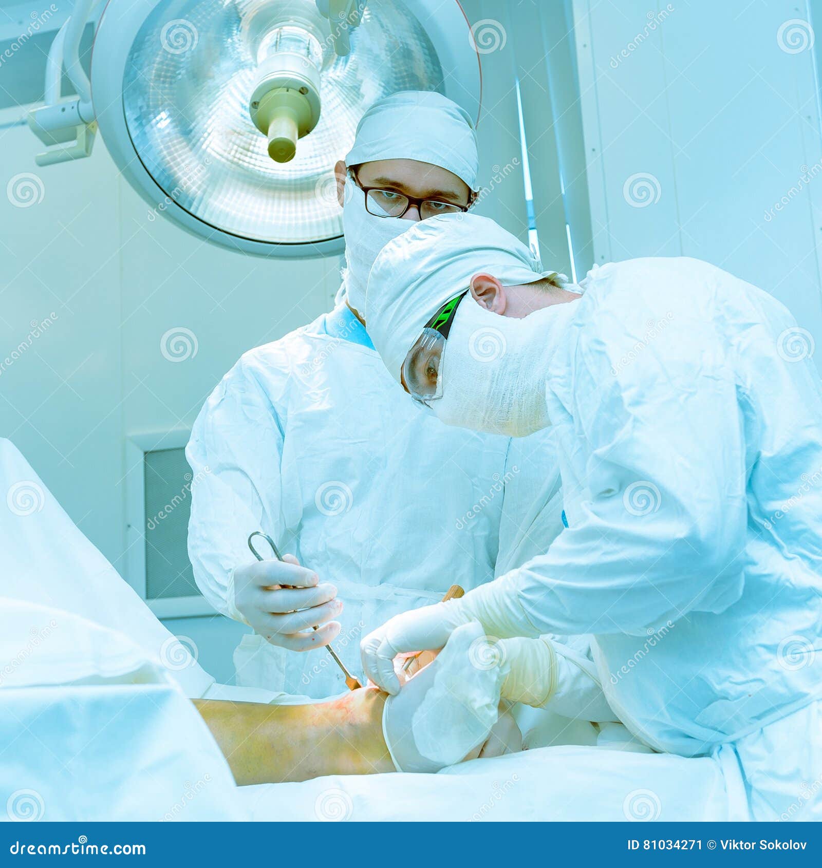 Doctors Operate on a Patient Stock Image - Image of assistant, female ...