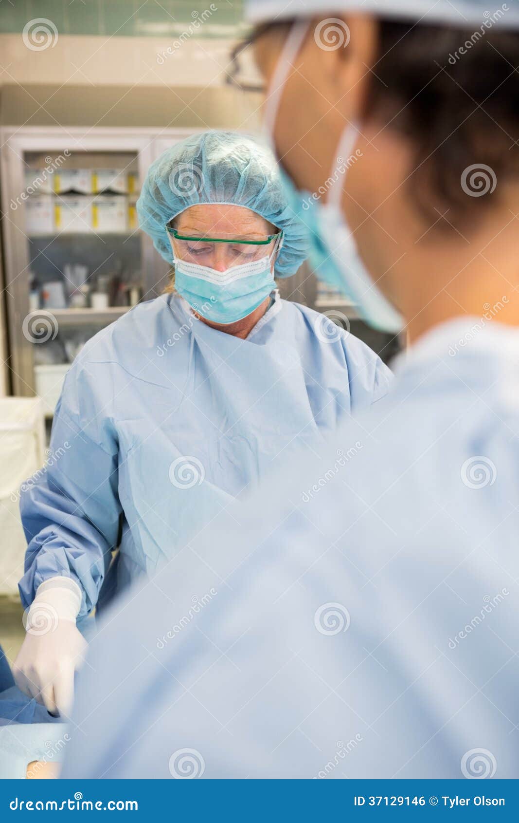 Doctors Operating Patient stock photo. Image of perioperative - 37129146