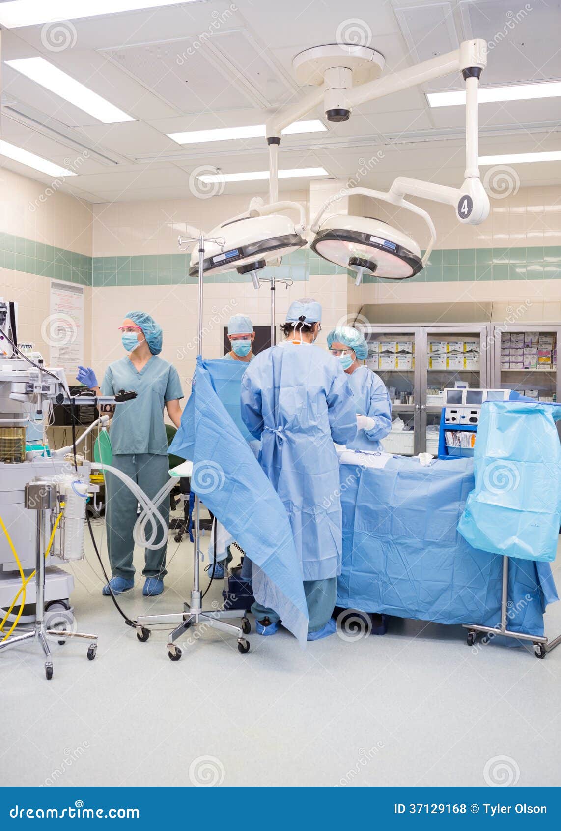 Doctors Operating Patient stock photo. Image of operating - 37129168