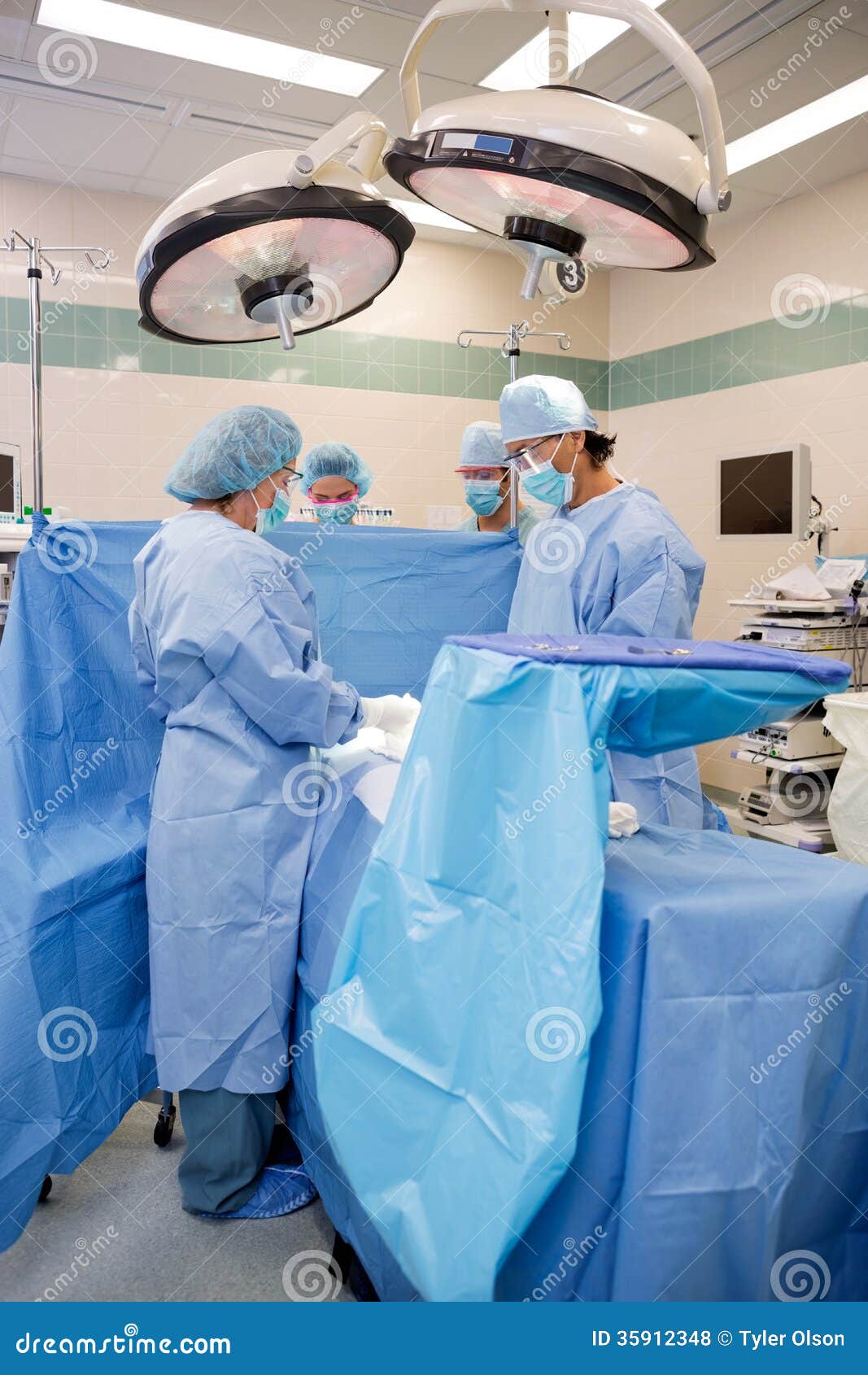 Doctors Operating on Patient Stock Photo - Image of person, equipment ...