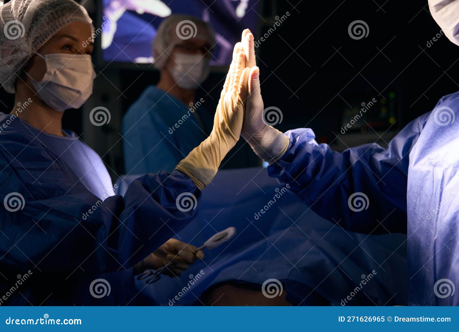 Doctors in Operating Room Give High Five after Successful Operation ...