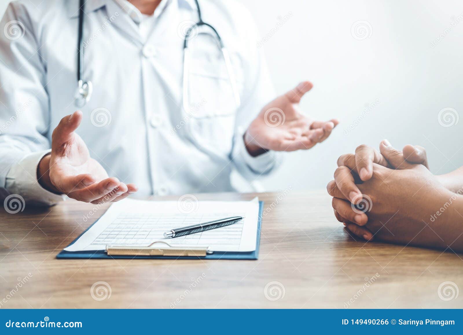 Doctors and Patients Sit and Talk. at the Table Near the Window in the ...