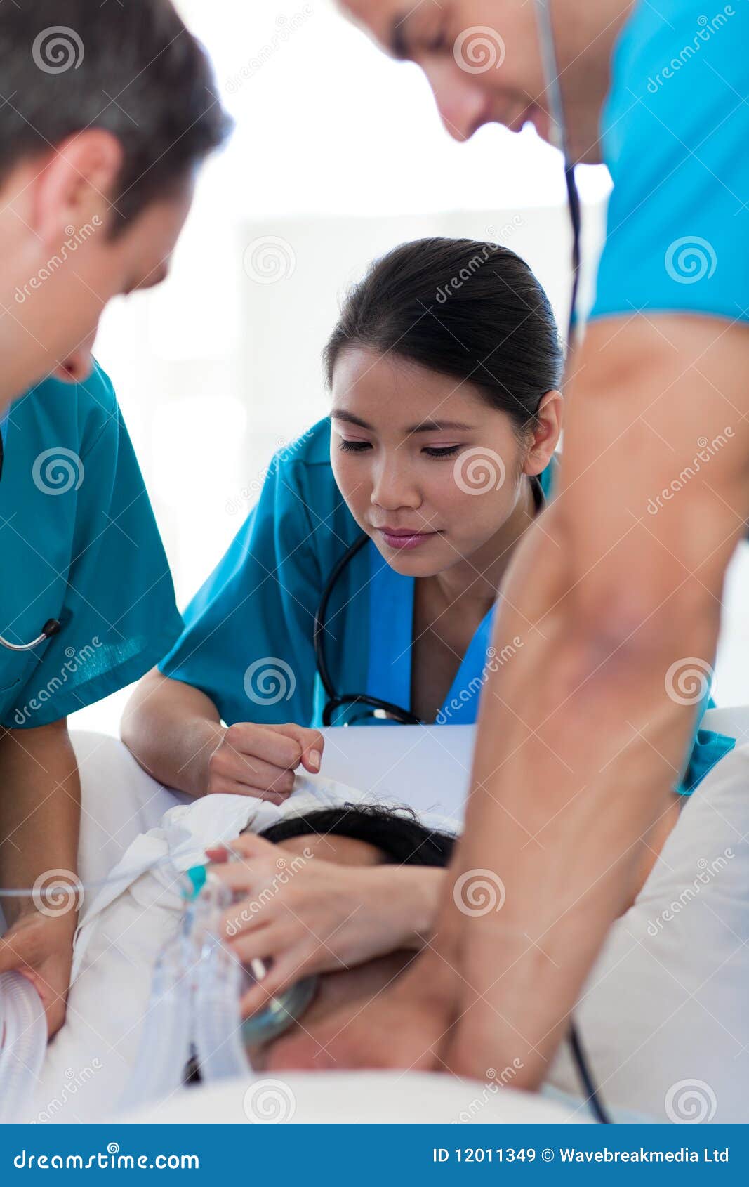Doctors Performing CPR on a Patient Stock Image - Image of people ...
