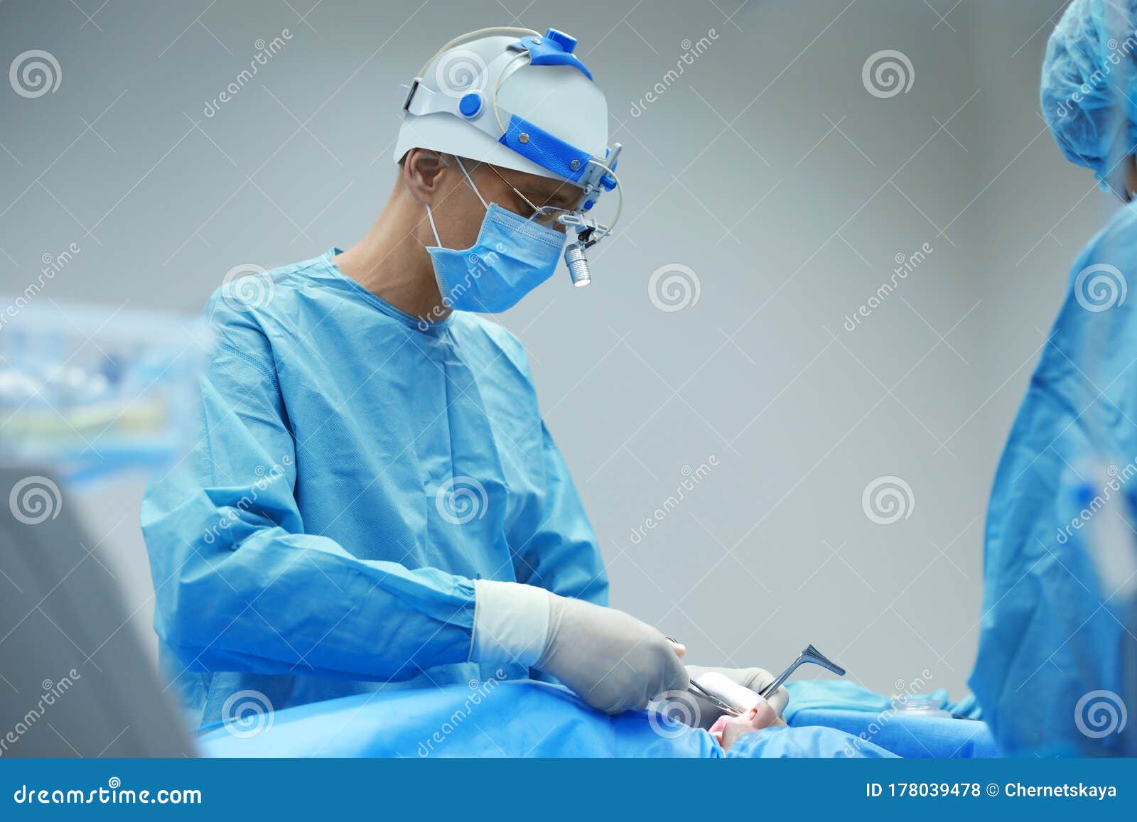 Doctors Performing Operation in Surgery Room Stock Photo - Image of ...