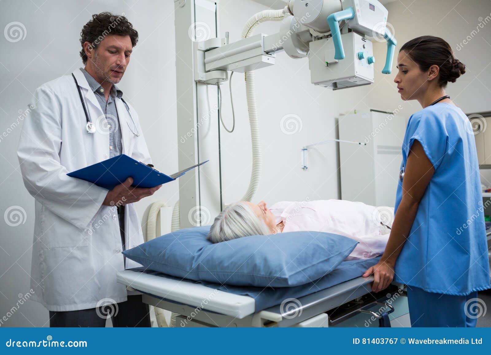 Doctors Performing a X-ray Test on Patient Chest Stock Image - Image of ...