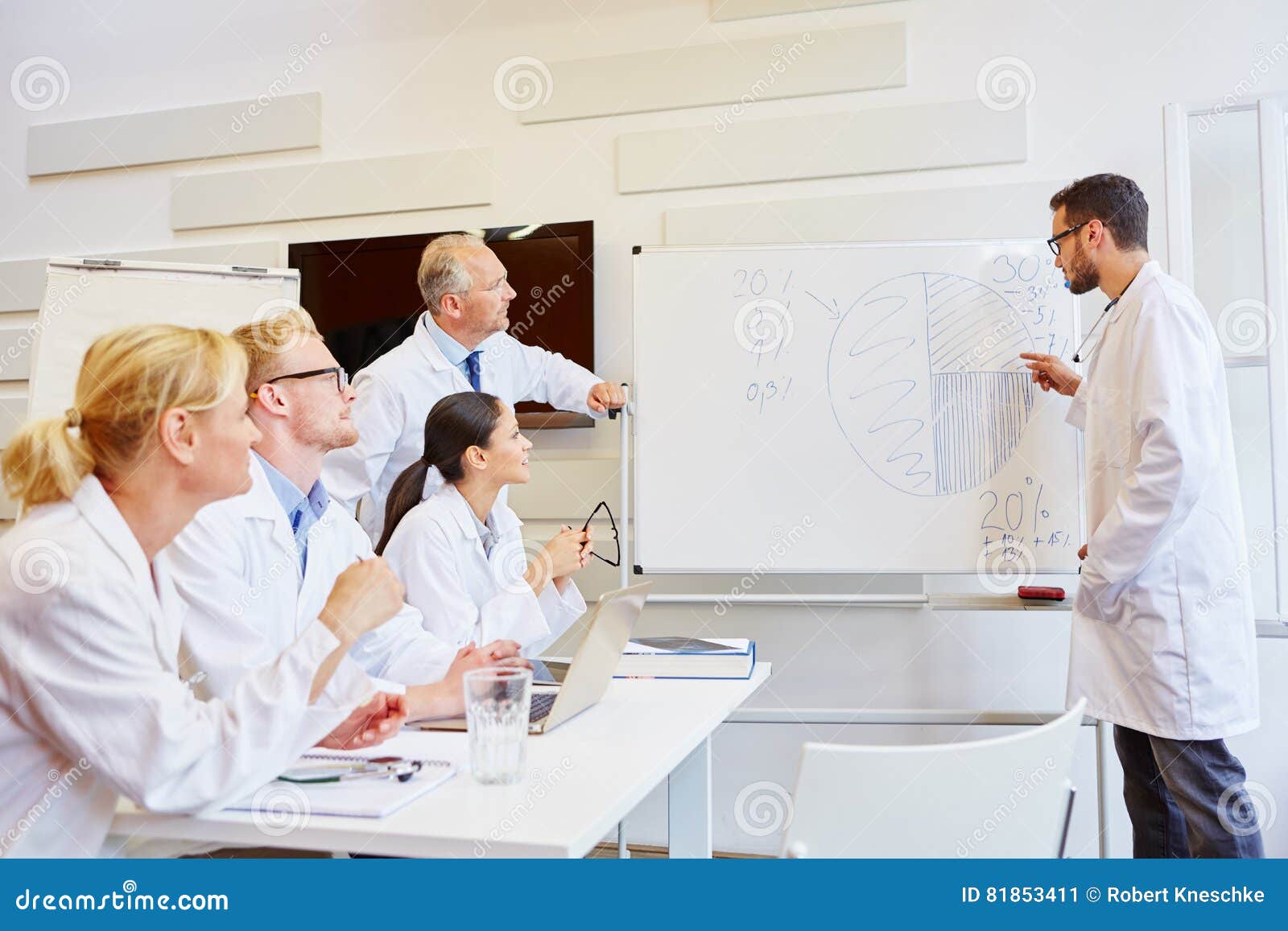 Doctors presenting results stock image. Image of statistics - 81853411