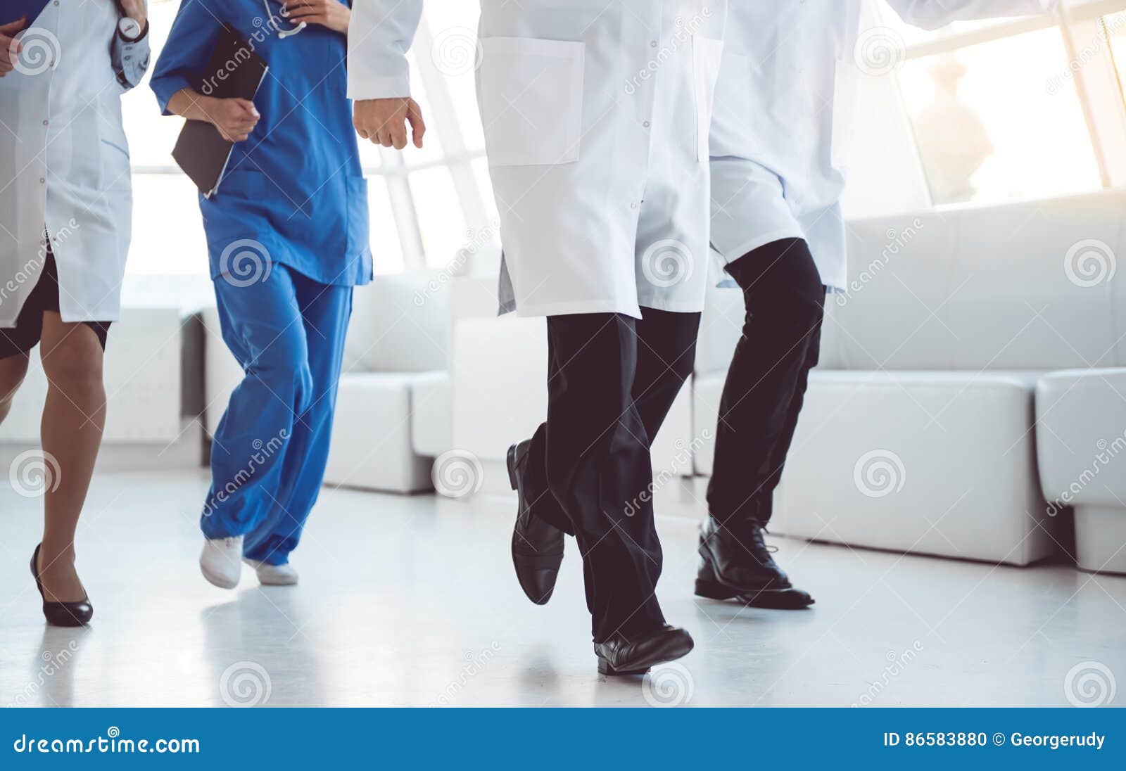 Doctors rushing for help stock photo. Image of female - 86583880