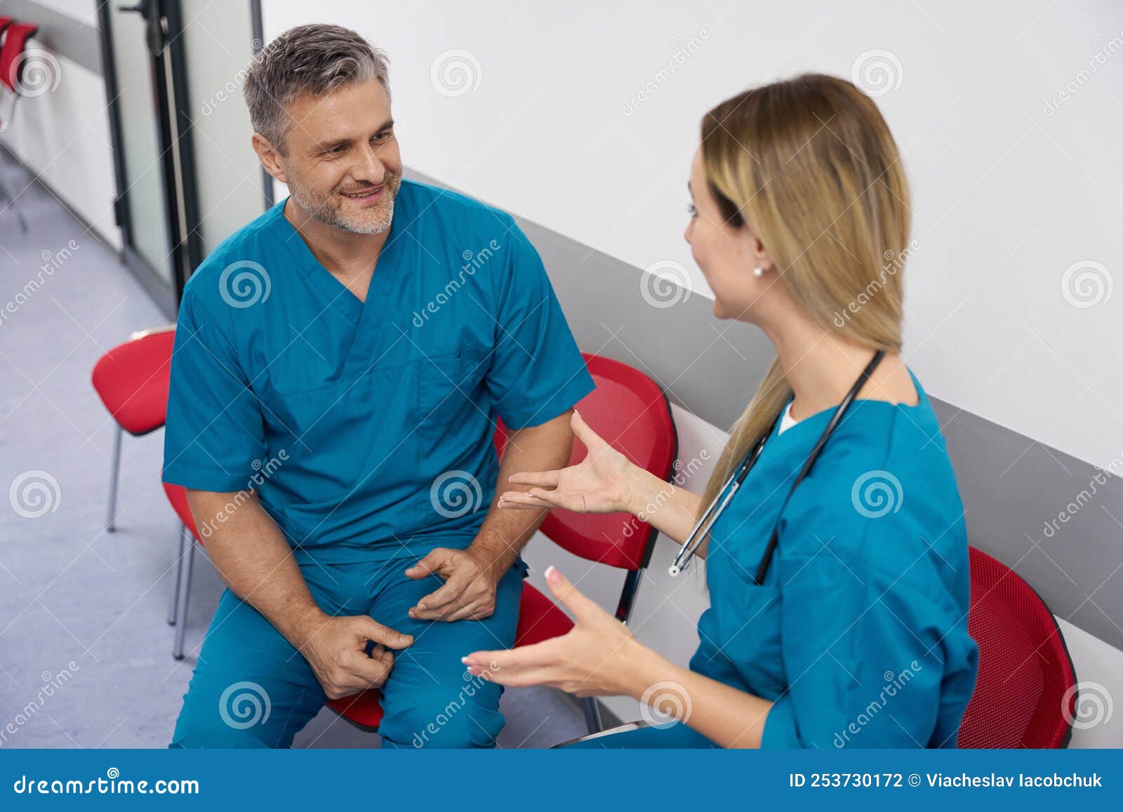 Two Doctors Sit and Communicate with Each Other Stock Photo - Image of ...