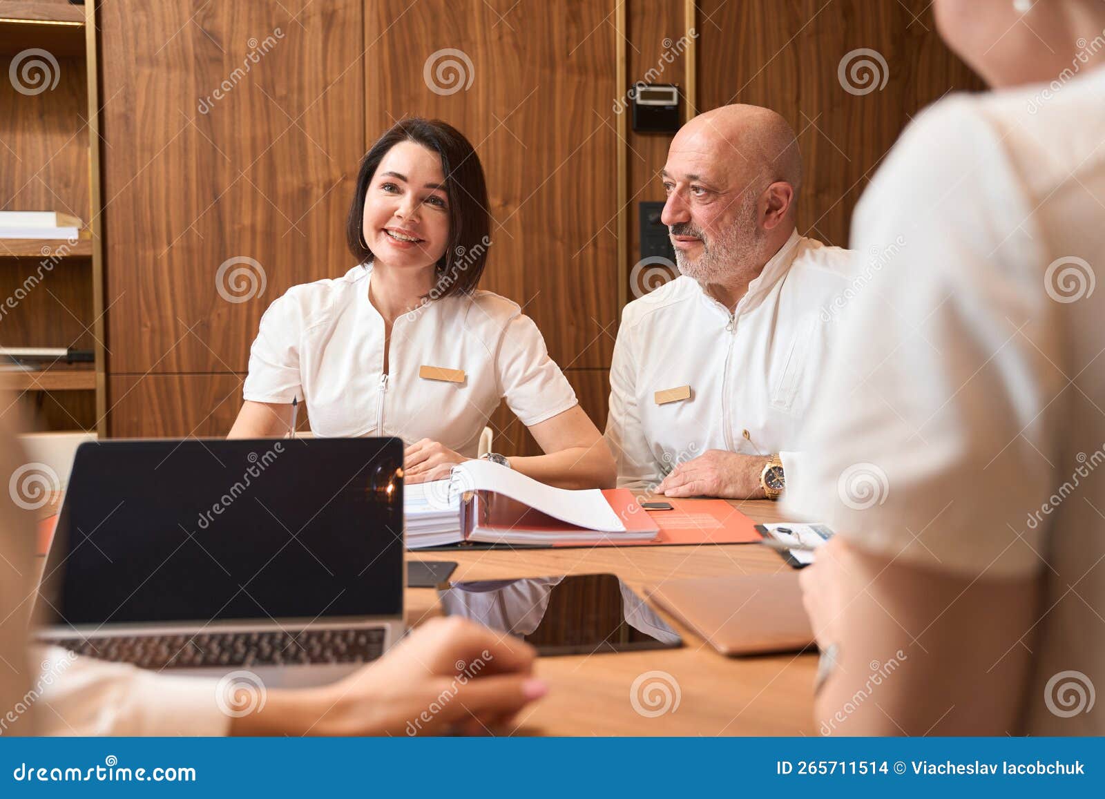 Doctors Sit at a Table with Laptops and Documents Stock Photo - Image ...